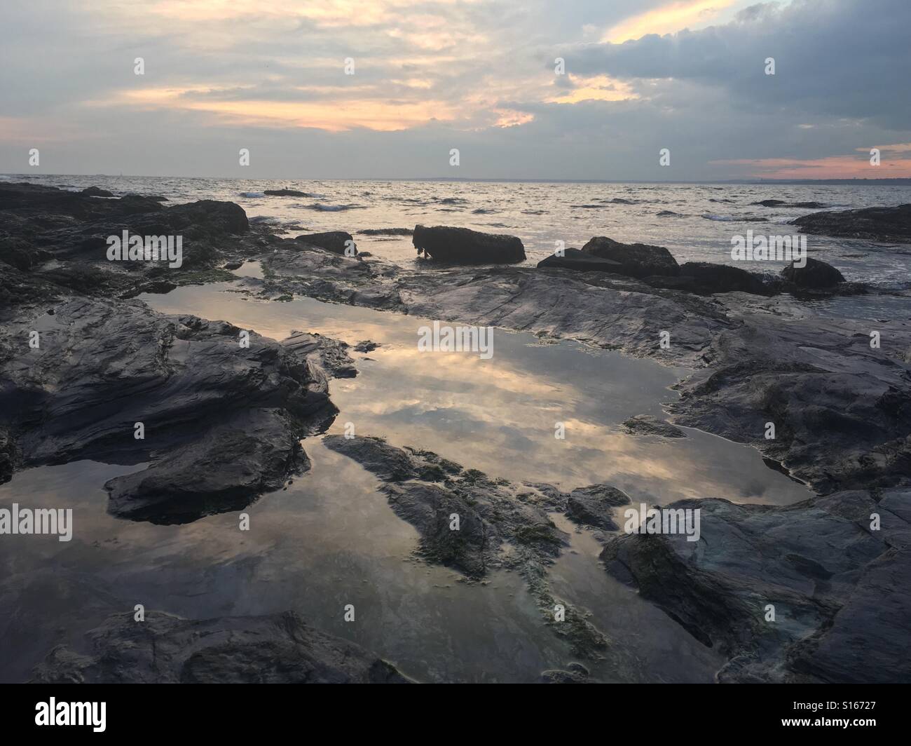 Reflection in rocks Stock Photo - Alamy