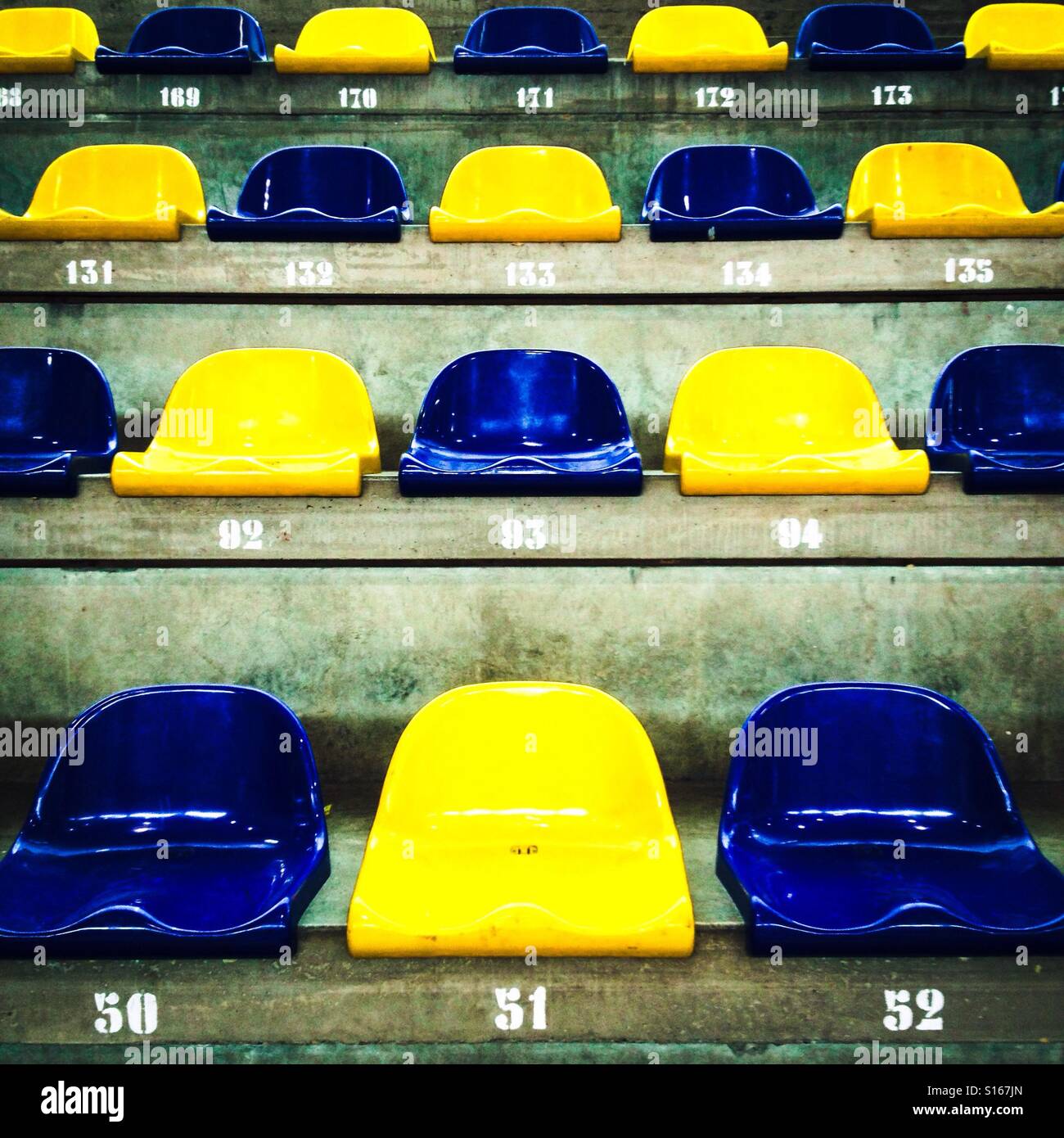 colourful seats with numbers Stock Photo - Alamy