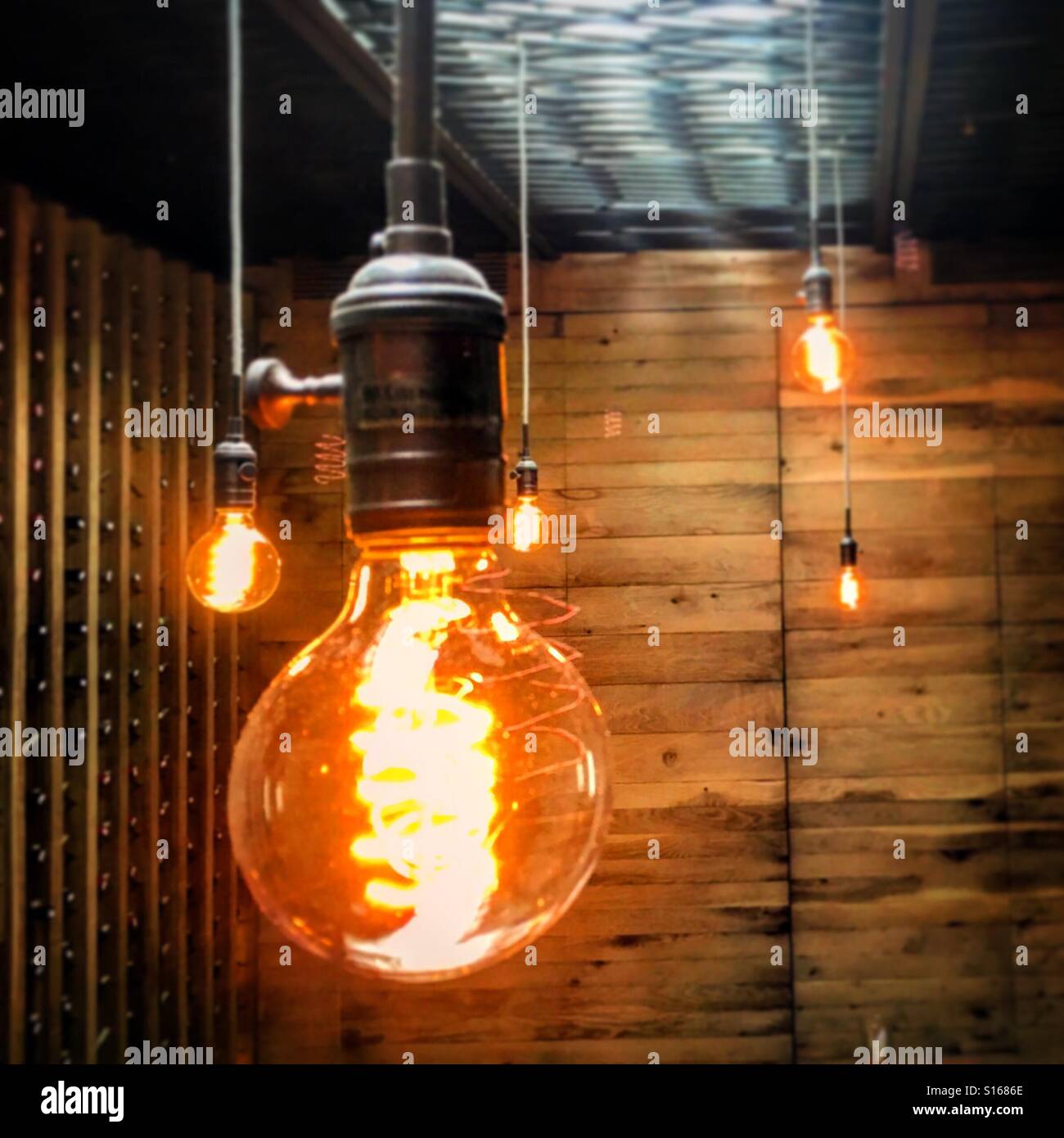 Light bulb hanging Stock Photo - Alamy