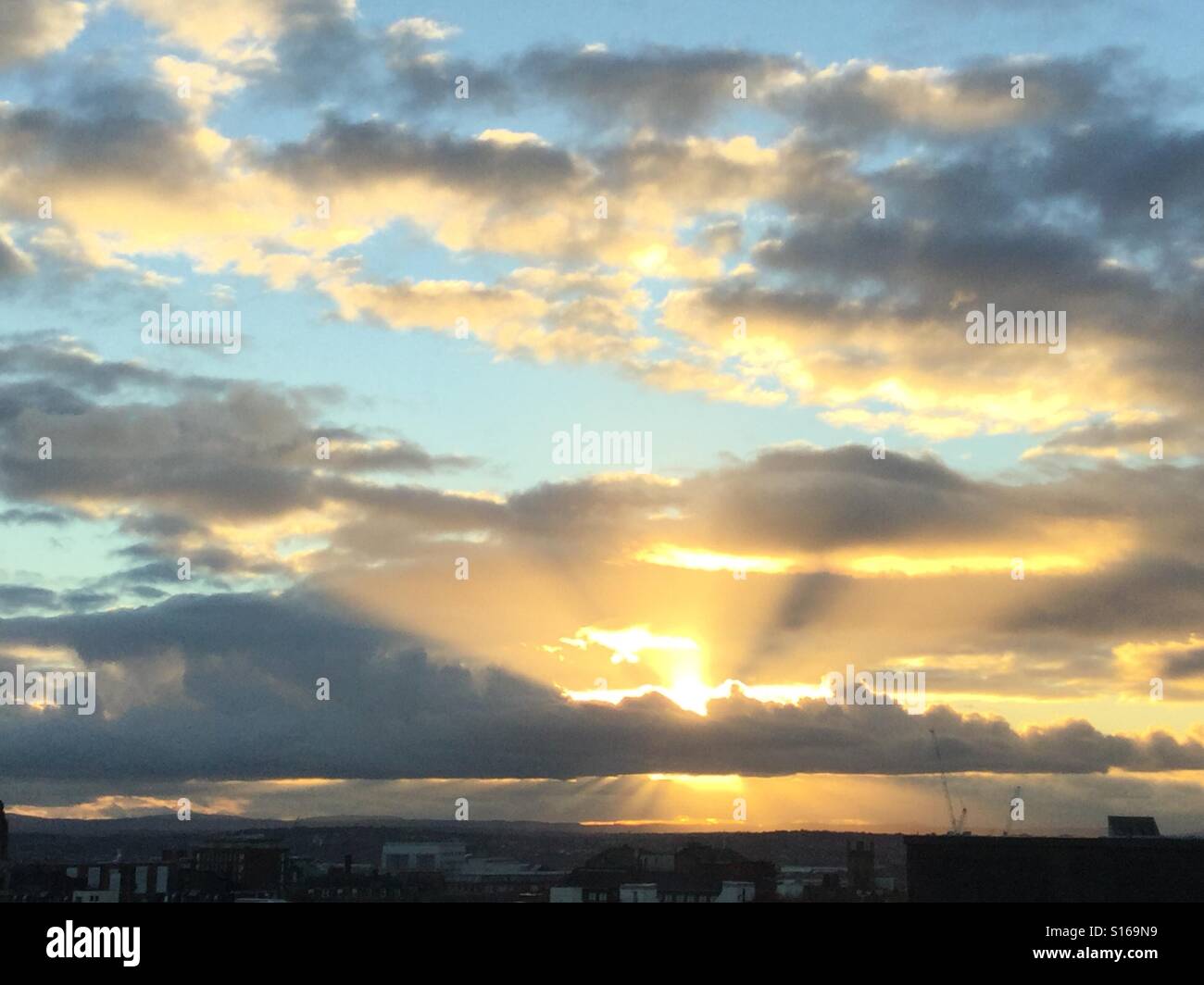 Dark clouds and sun rays hi-res stock photography and images - Alamy