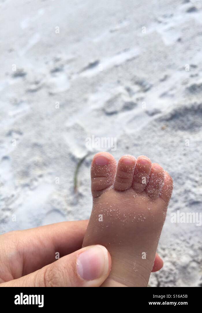 Sandy Baby Toes Stock Photo - Alamy