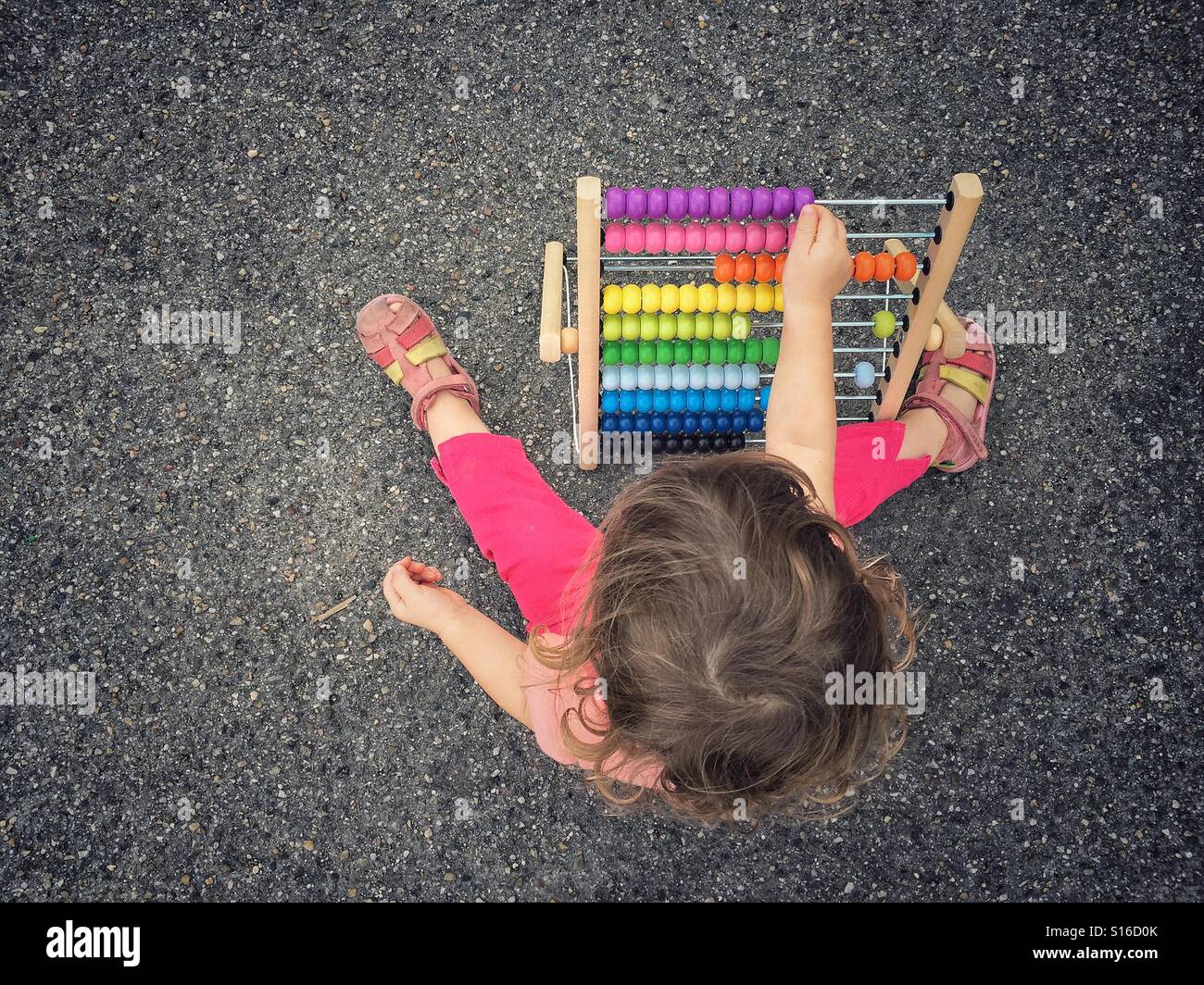 Toddler with counter toy. concept or early learning child Stock Photo ...
