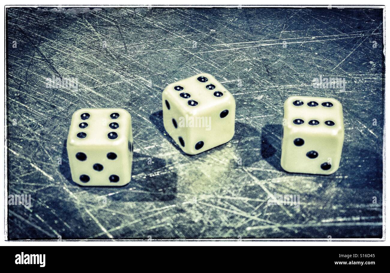 Three dices, every dice is showing six points Stock Photo - Alamy