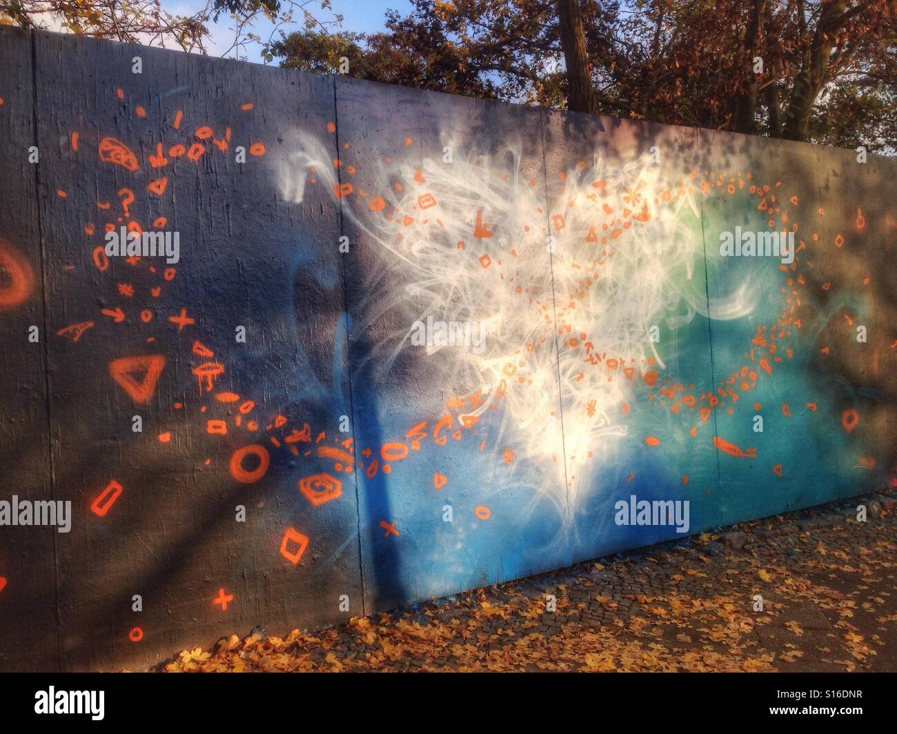 A graffiti of a white heart with an eternity symbol Stock Photo - Alamy