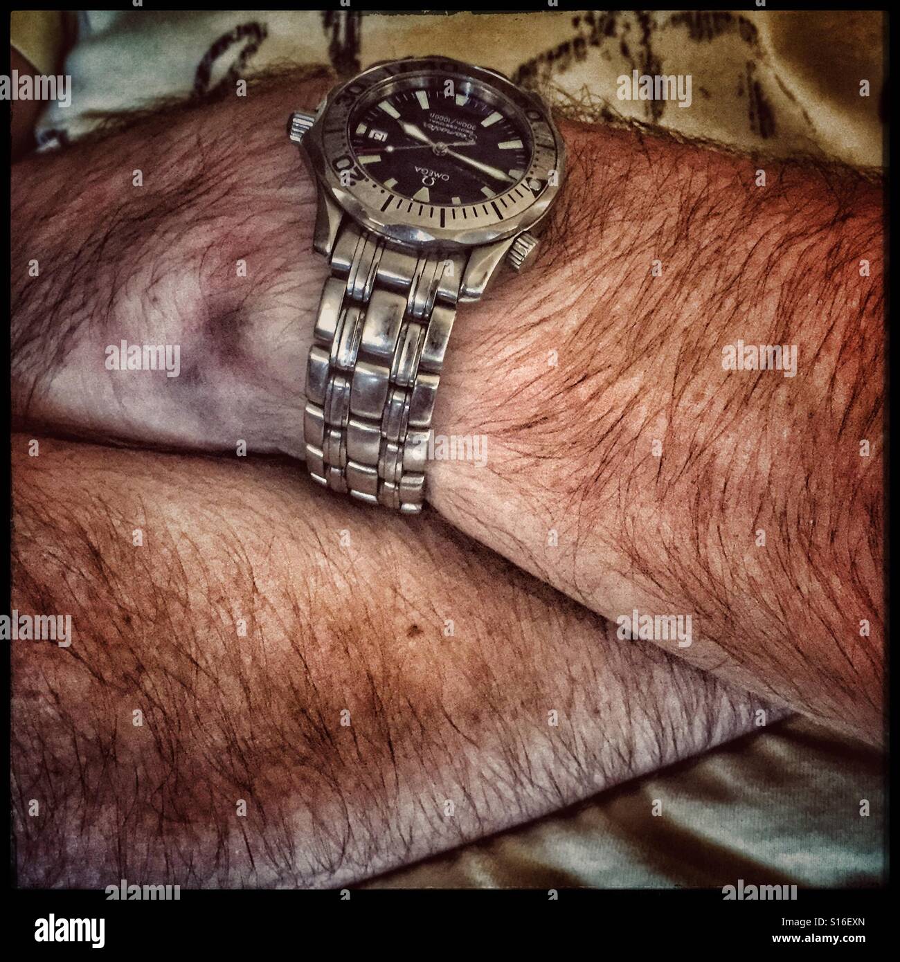 Man folding his arms Stock Photo - Alamy