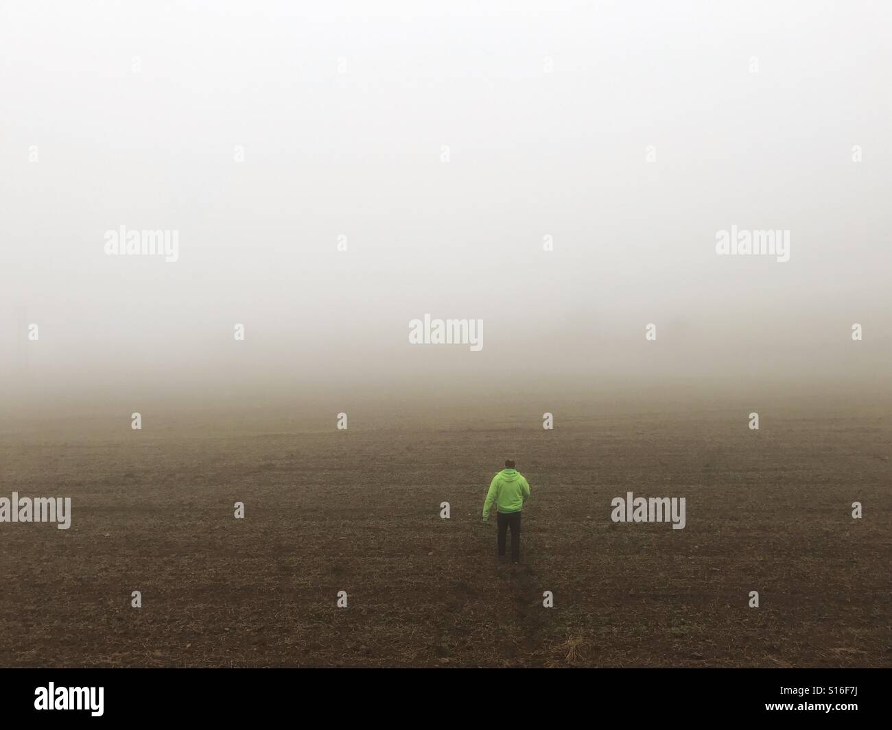 Man on a fog Stock Photo - Alamy
