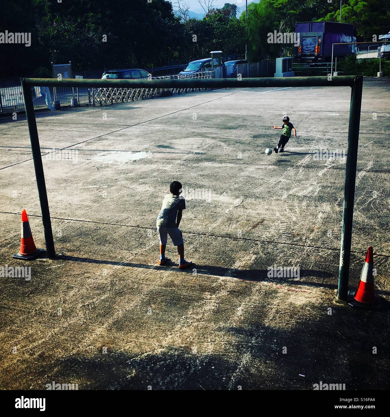 Two boys playing football on hi-res stock photography and images - Alamy