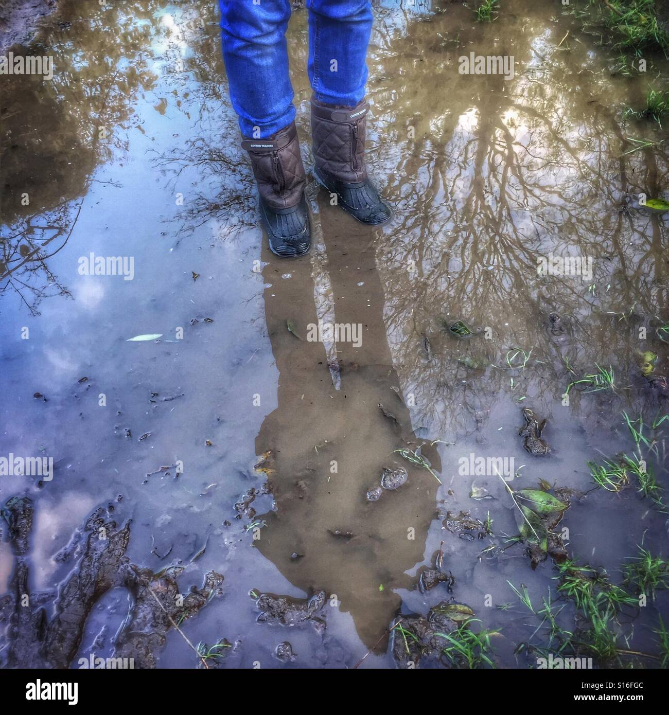 Wellies Feet Puddle High Resolution Stock Photography and Images - Alamy