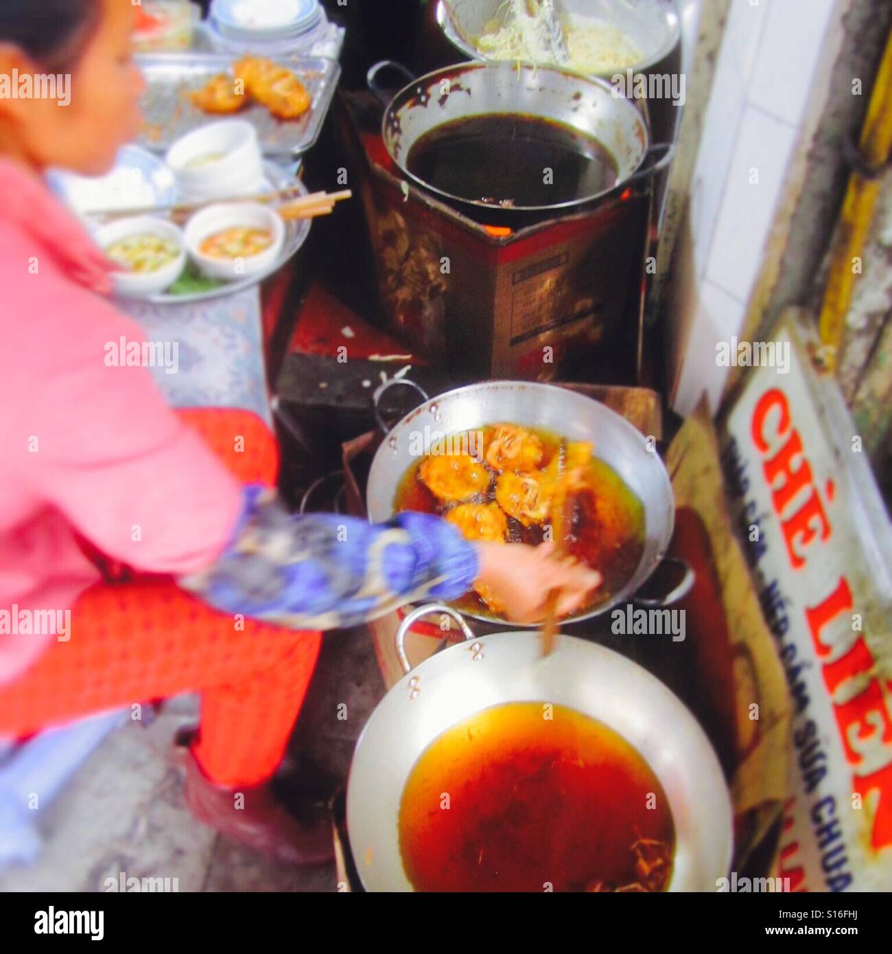 Vietnamese woman cooking hi-res stock photography and images - Alamy