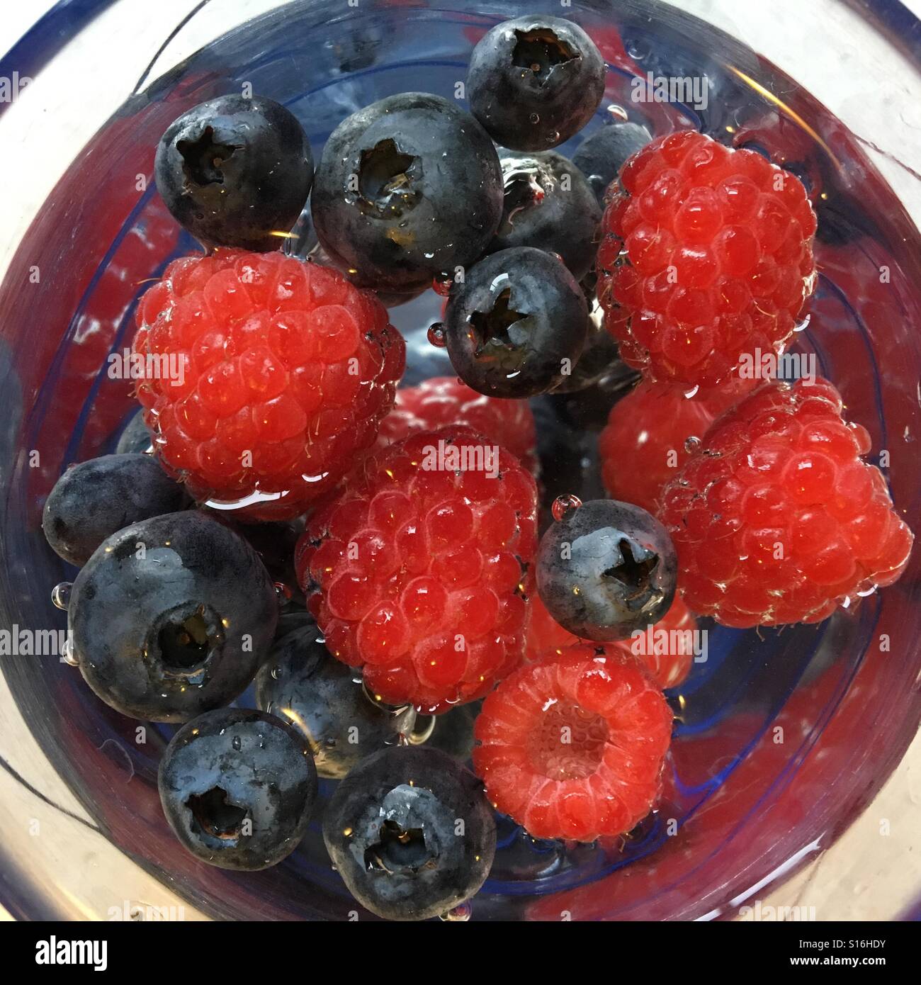 Raspberries blueberries on fruit smartphone stock photos and images - Alamy