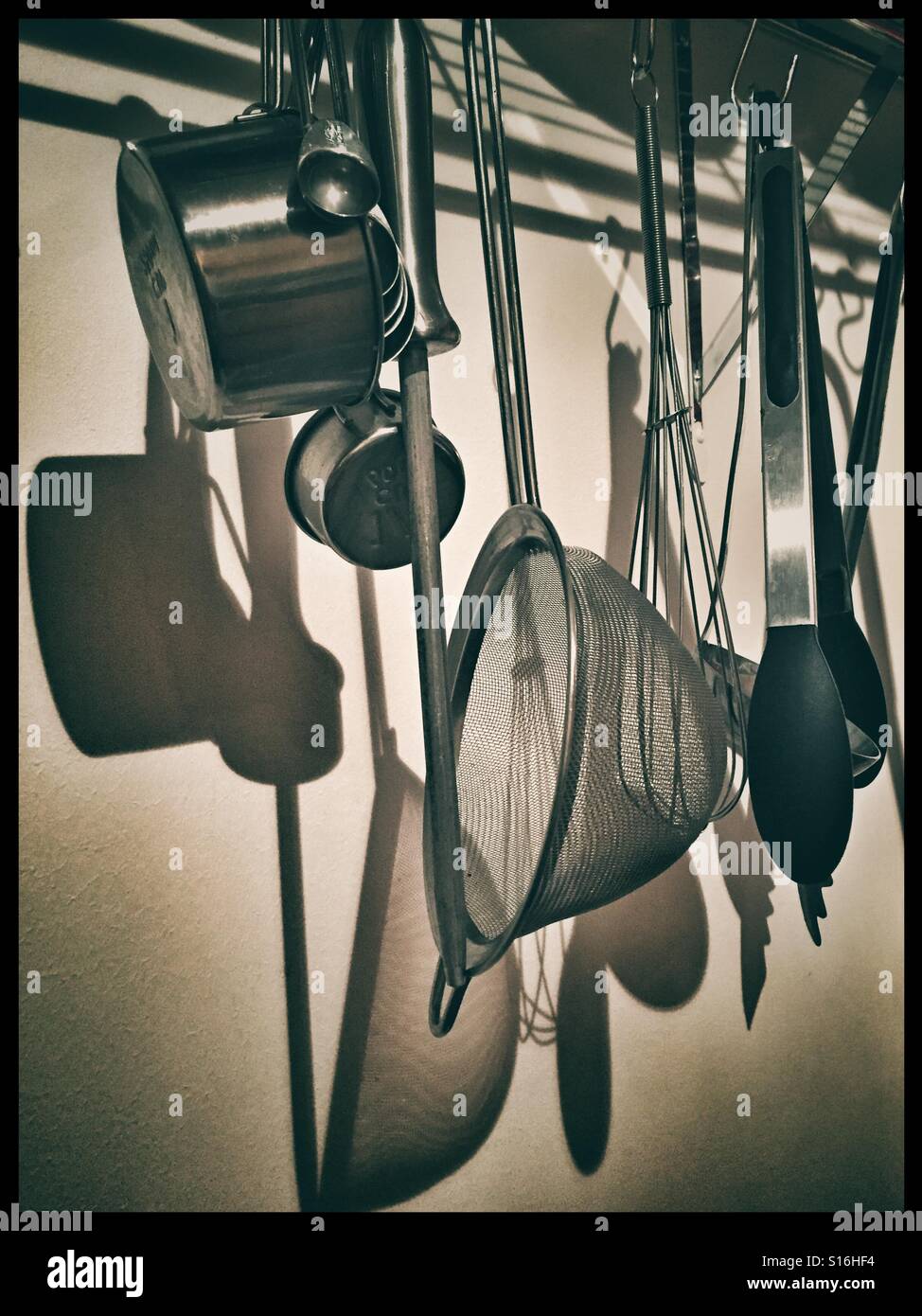 Hanging utensils hi-res stock photography and images - Alamy