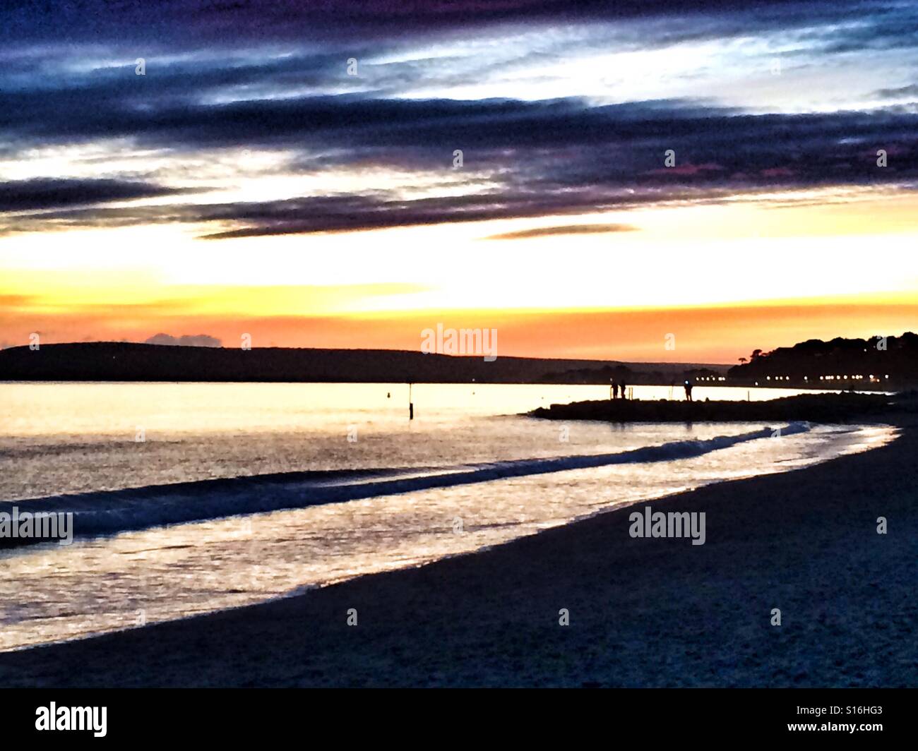Stunning sunset at Poole looking towards Sandbanks Stock Photo - Alamy