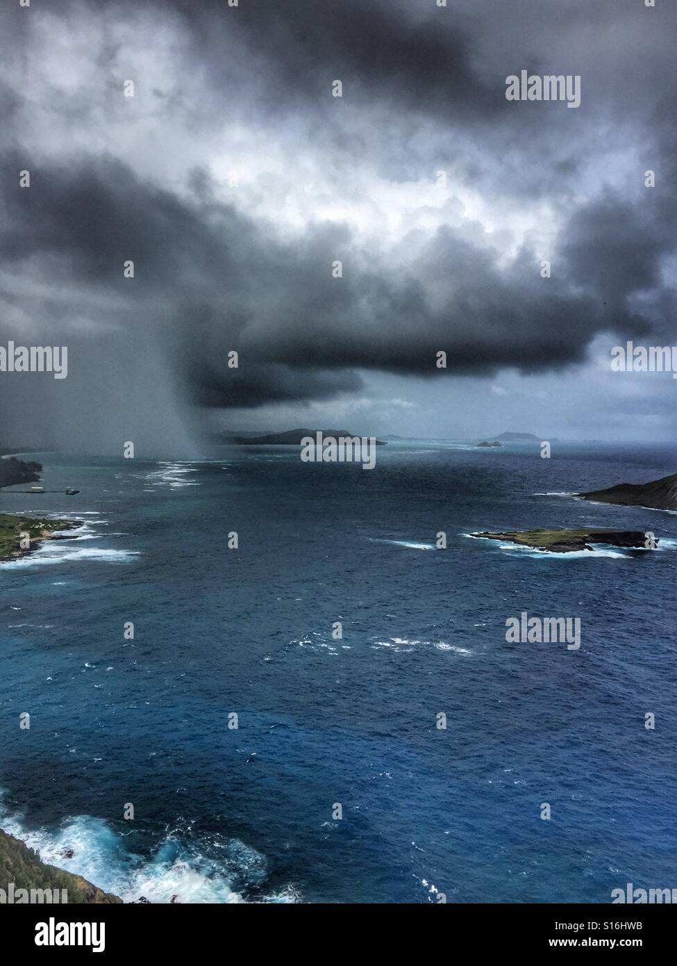 Rain coming down in the distance. Oahu, Hawaii Stock Photo - Alamy
