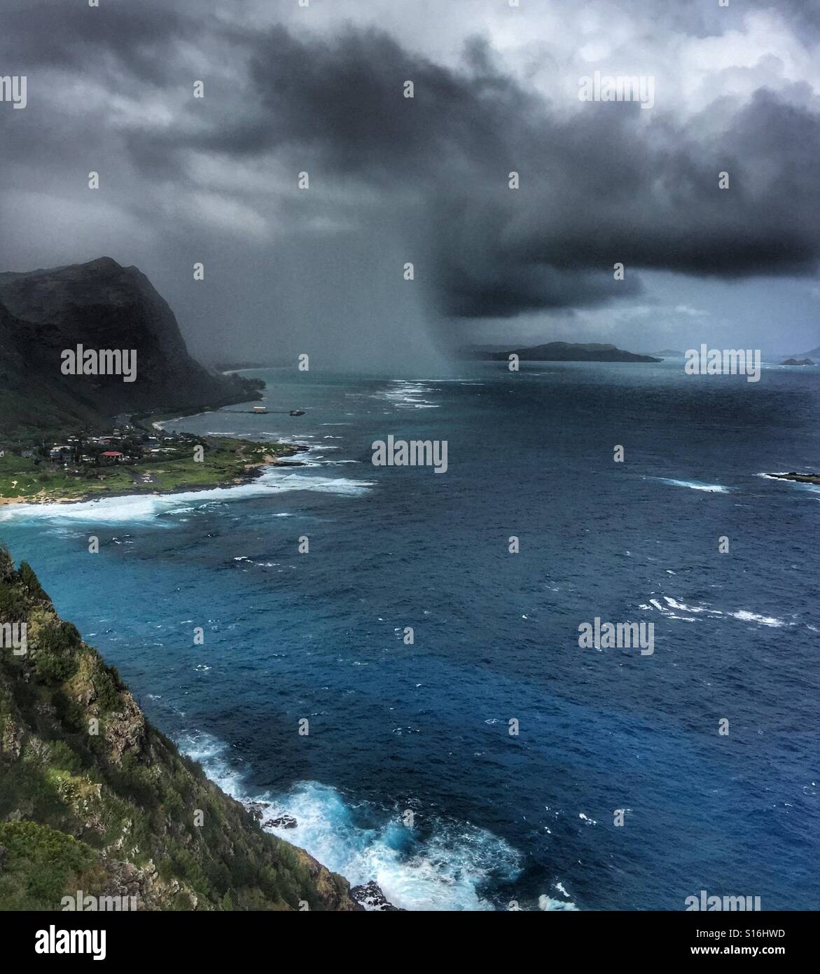 Rain clouds ocean mountains hi-res stock photography and images - Alamy