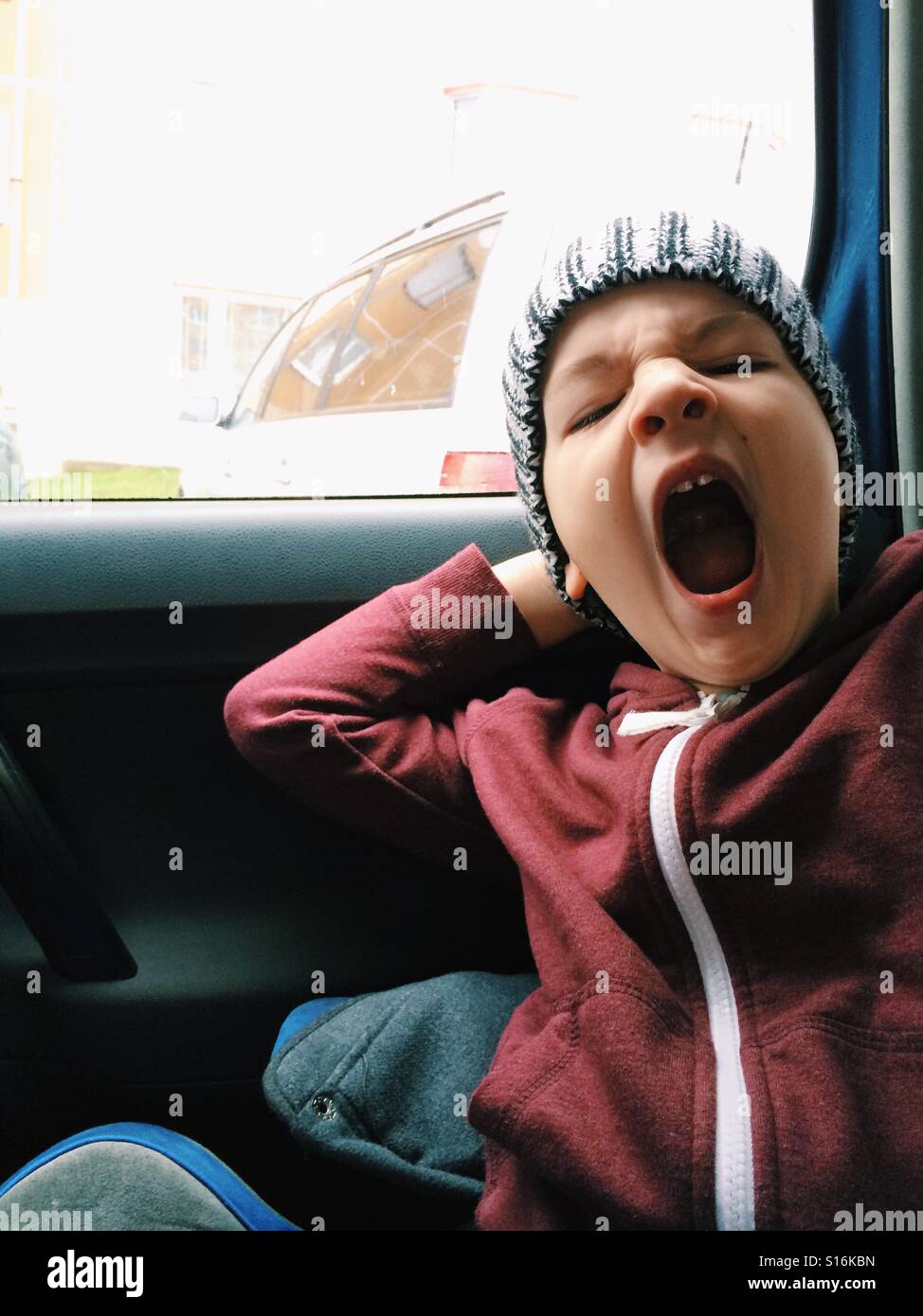 Yawning boy hi-res stock photography and images - Alamy