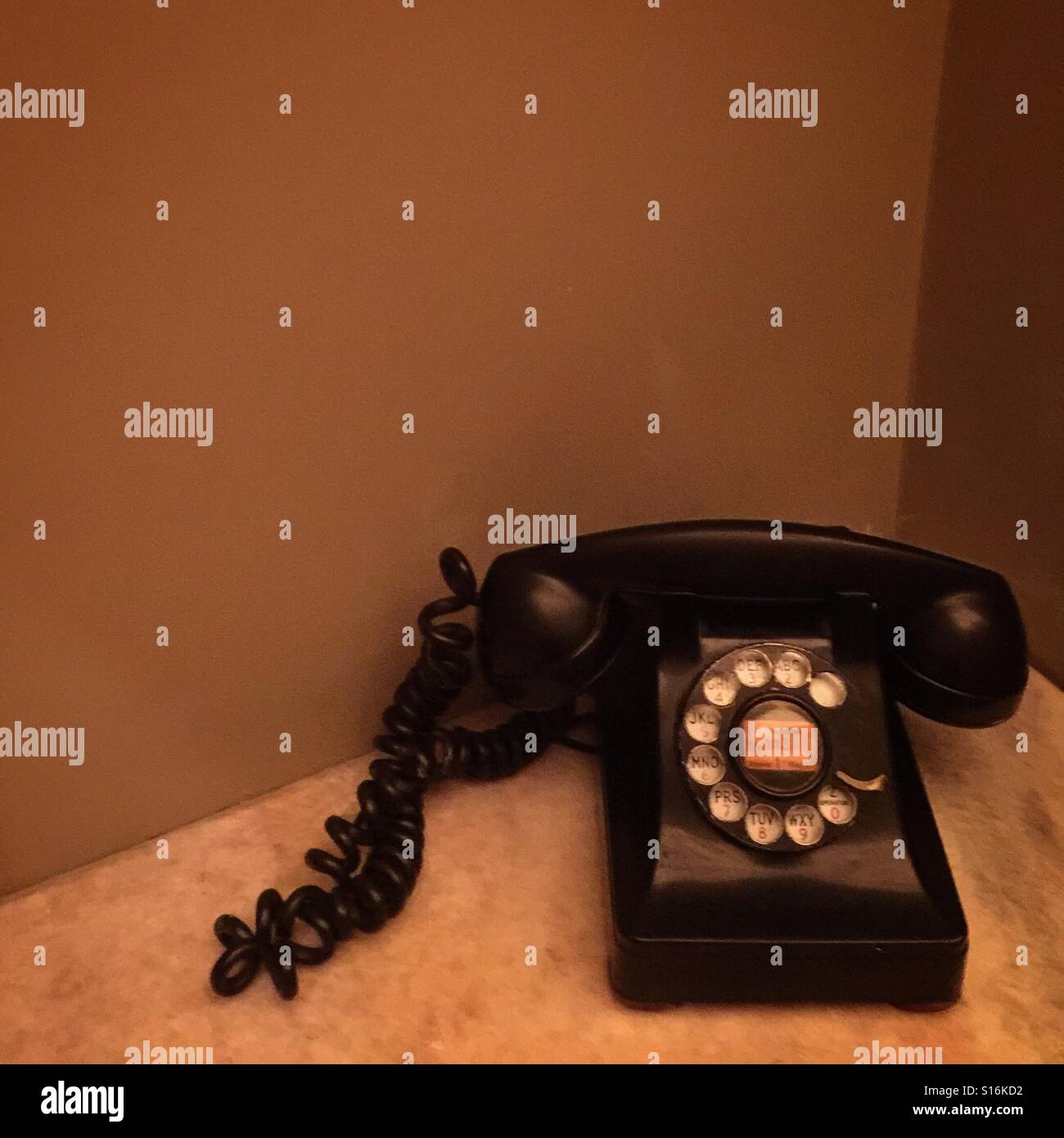 Old-fashioned telephone with rotary dial Stock Photo - Alamy