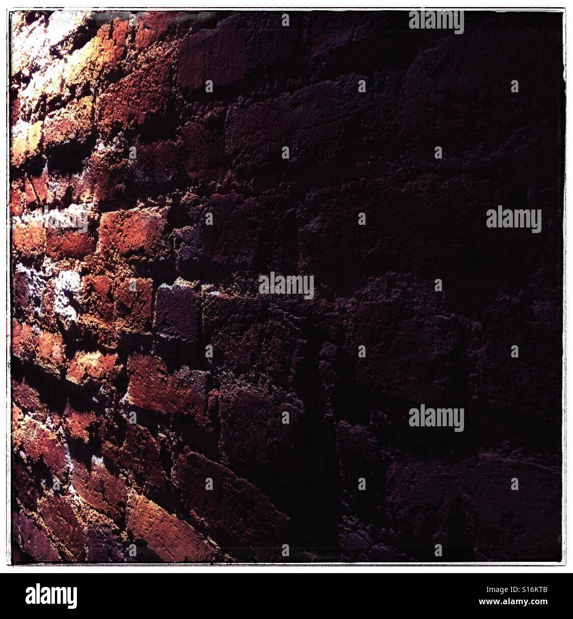 Brick wall at night Stock Photo - Alamy