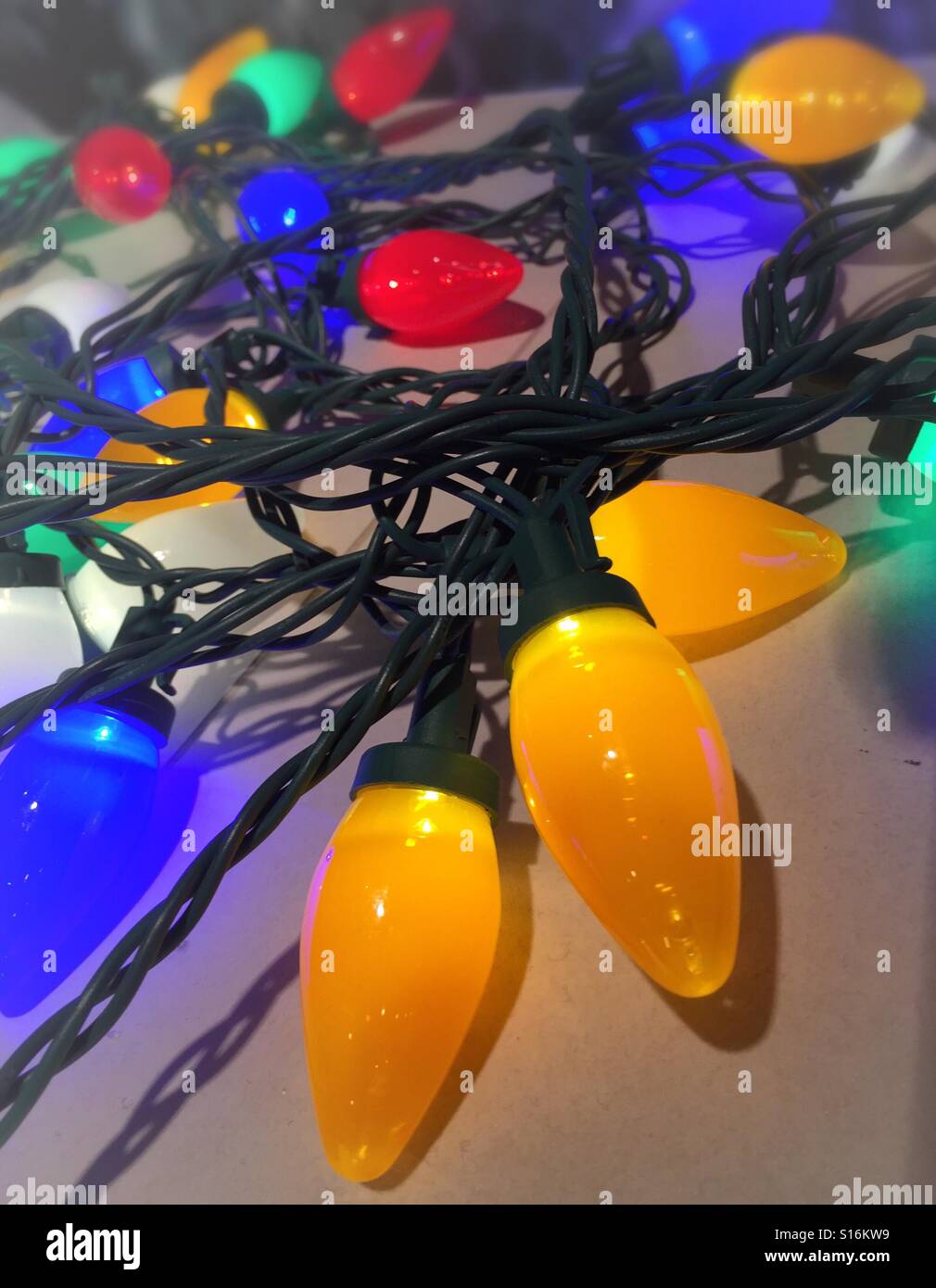 Strands of colorful holiday lights Stock Photo - Alamy