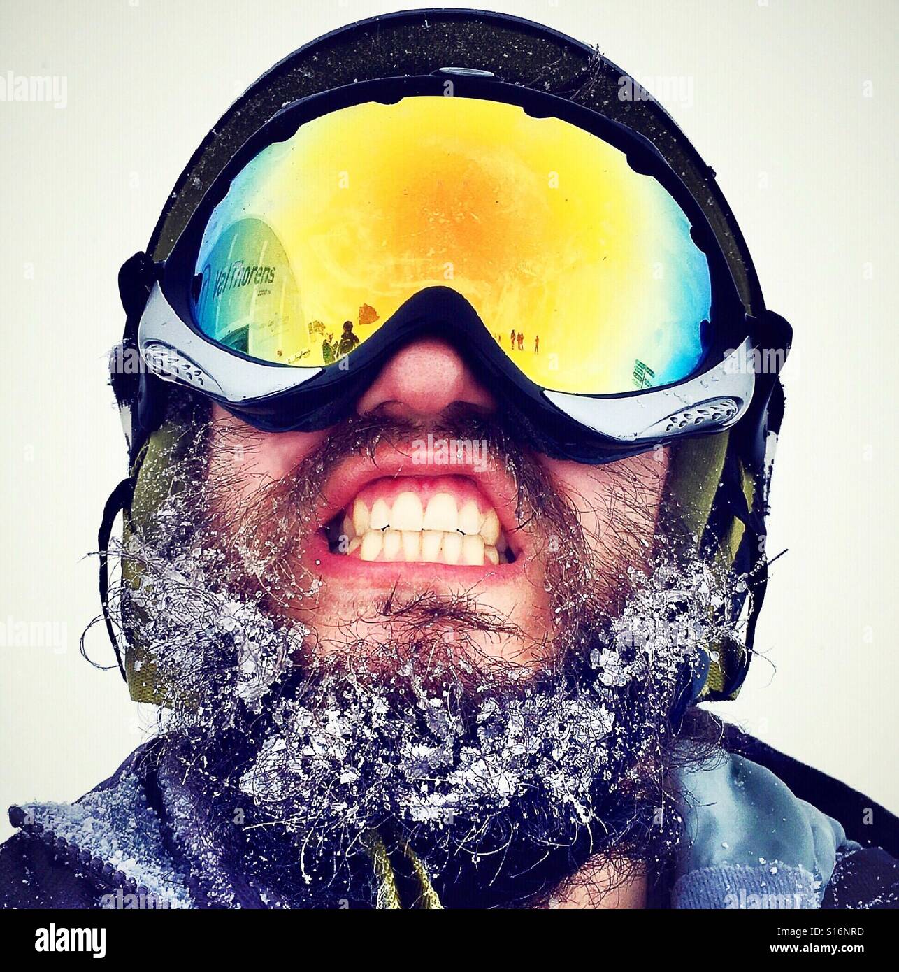 Extreme snowboarder with frozen beard Stock Photo - Alamy