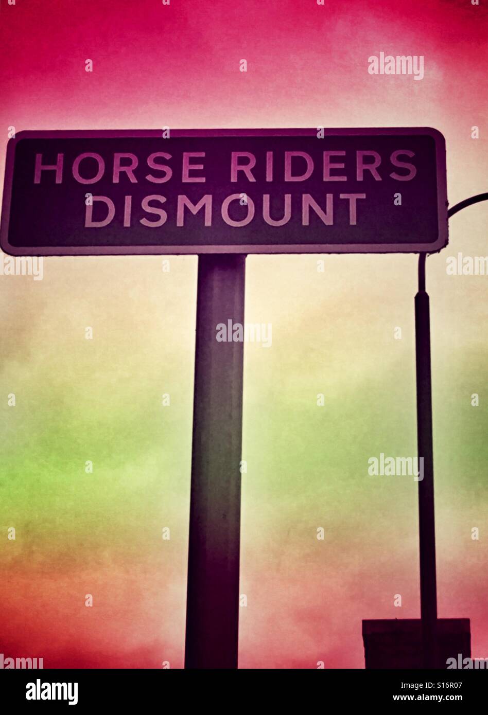 Horse riders dismount hi-res stock photography and images - Alamy