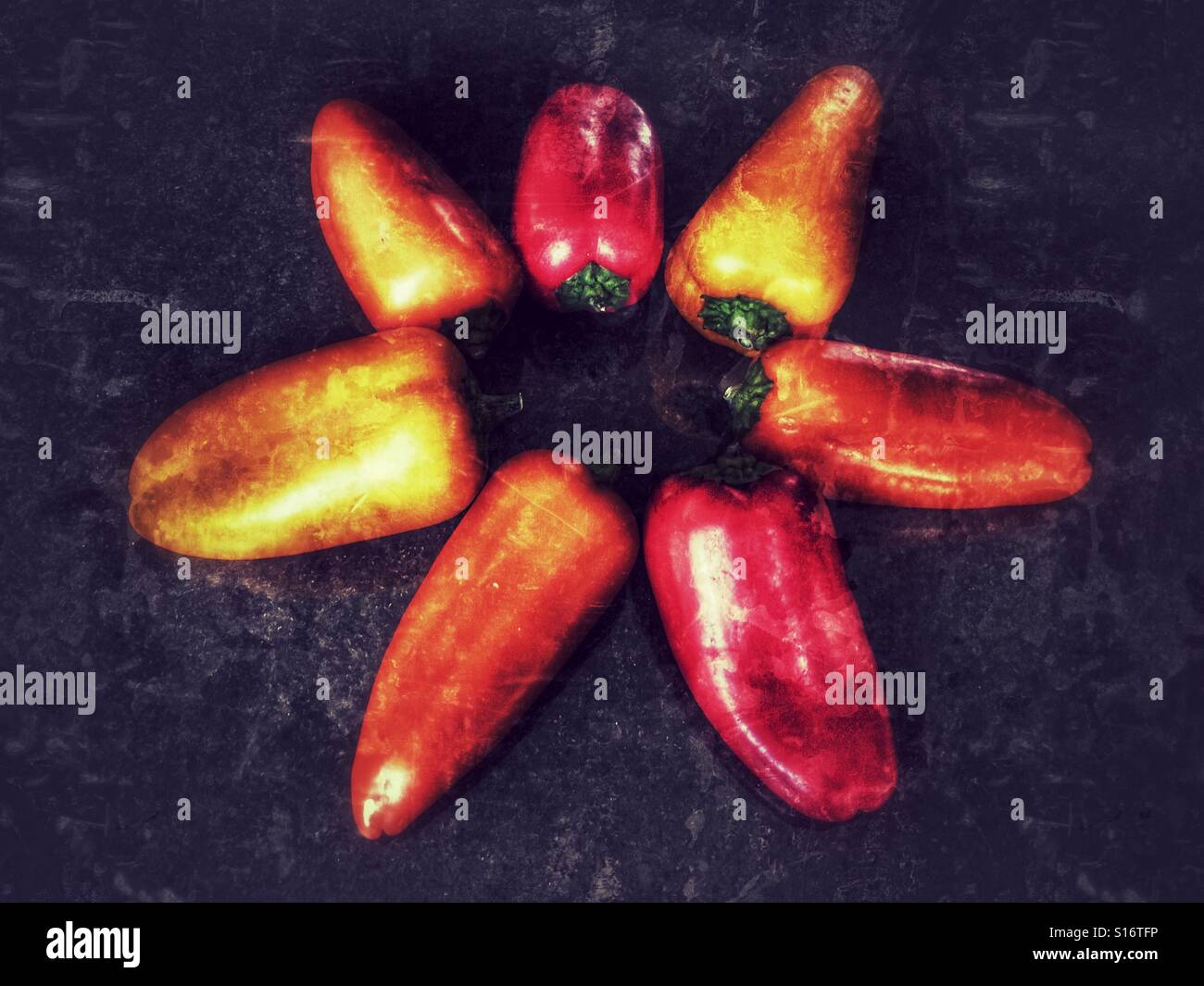 Star shape made from fresh red, Orange and yellow chilli peppers Stock ...