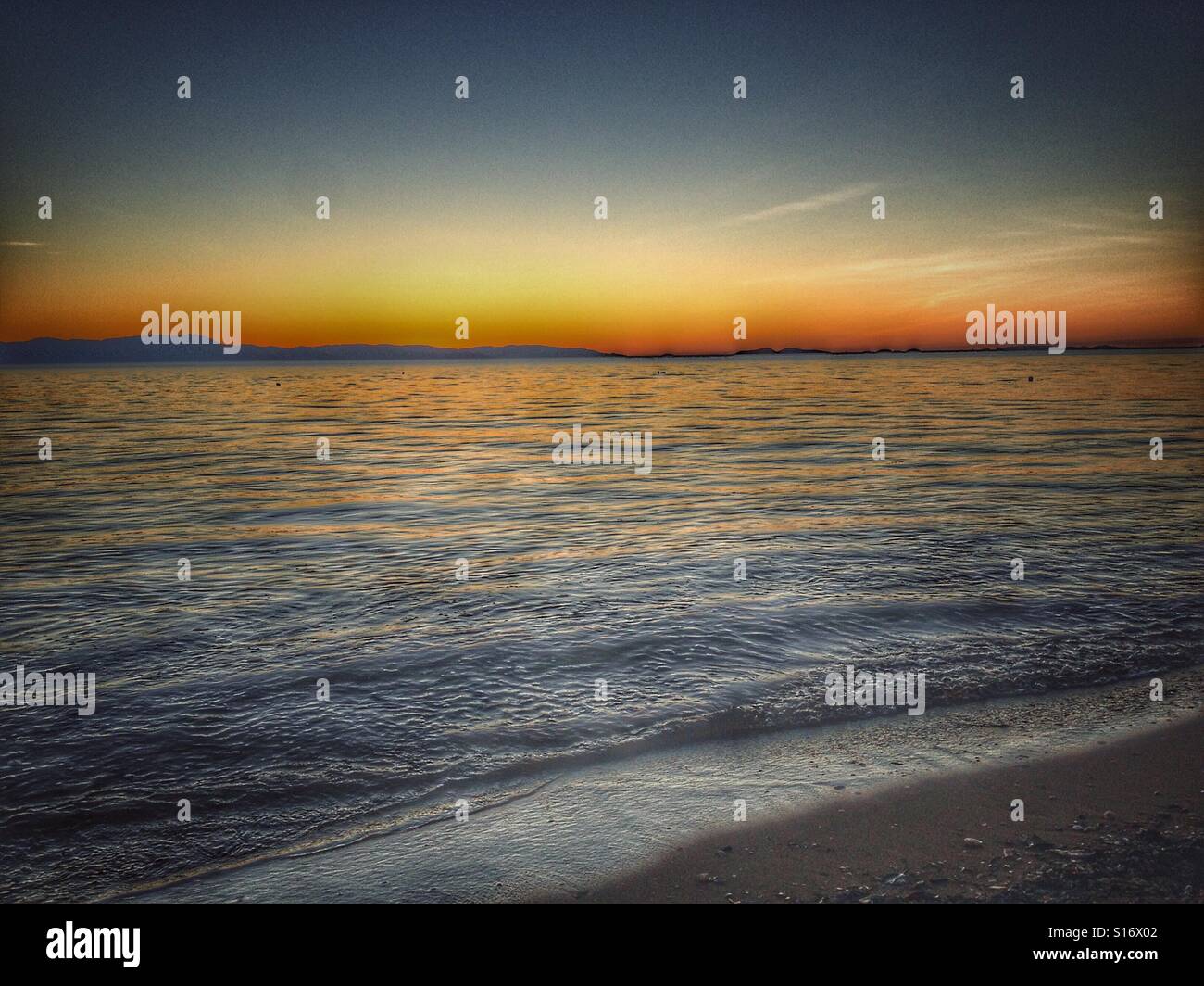 Sunset over sea, West Point, Magnetic Island, Australia Stock Photo - Alamy