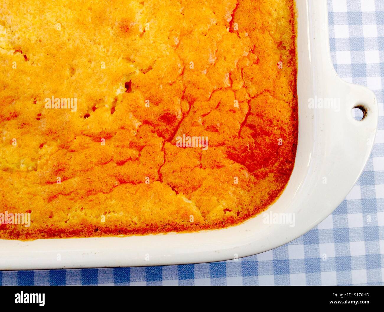 Apple and orange sponge pudding Stock Photo - Alamy