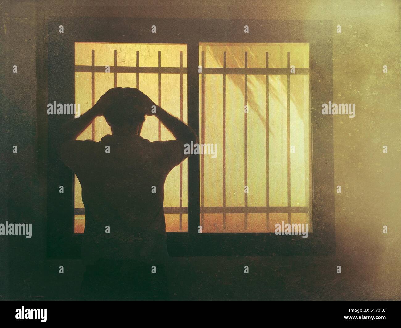 Man in jail hi-res stock photography and images - Alamy