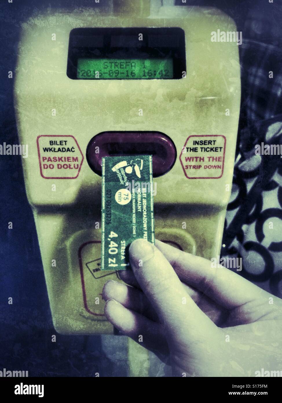 Ticket validation in public transport Stock Photo - Alamy