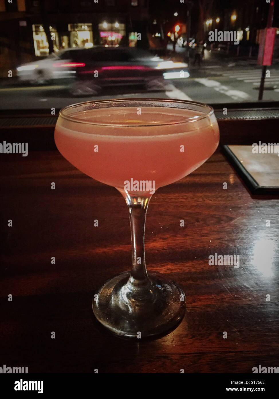 Cosmopolitan cocktail in bar in New York Stock Photo - Alamy