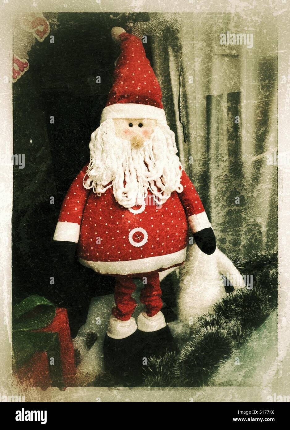 Santa figure in a shop window with grunge overlay Stock Photo - Alamy