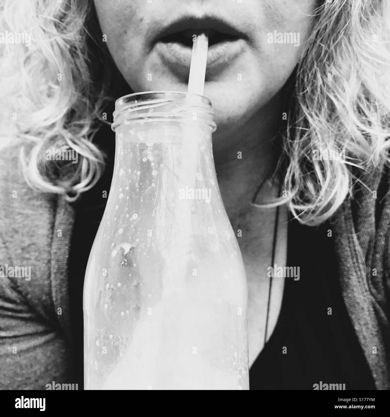 Lady drinking milkshake hi-res stock photography and images - Alamy