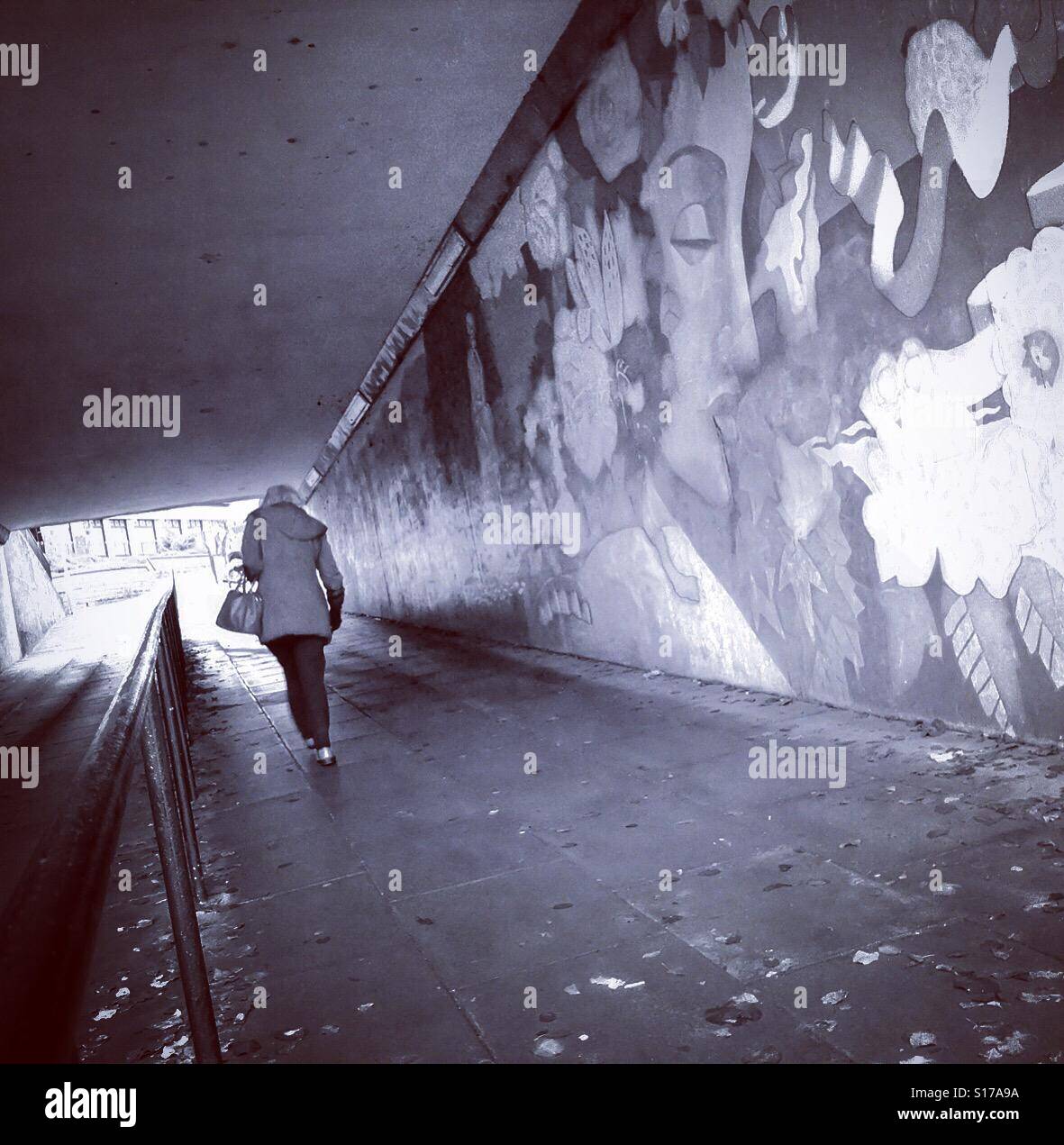 Woman walking through the underpass at Milngavie, Glasgow Stock Photo ...