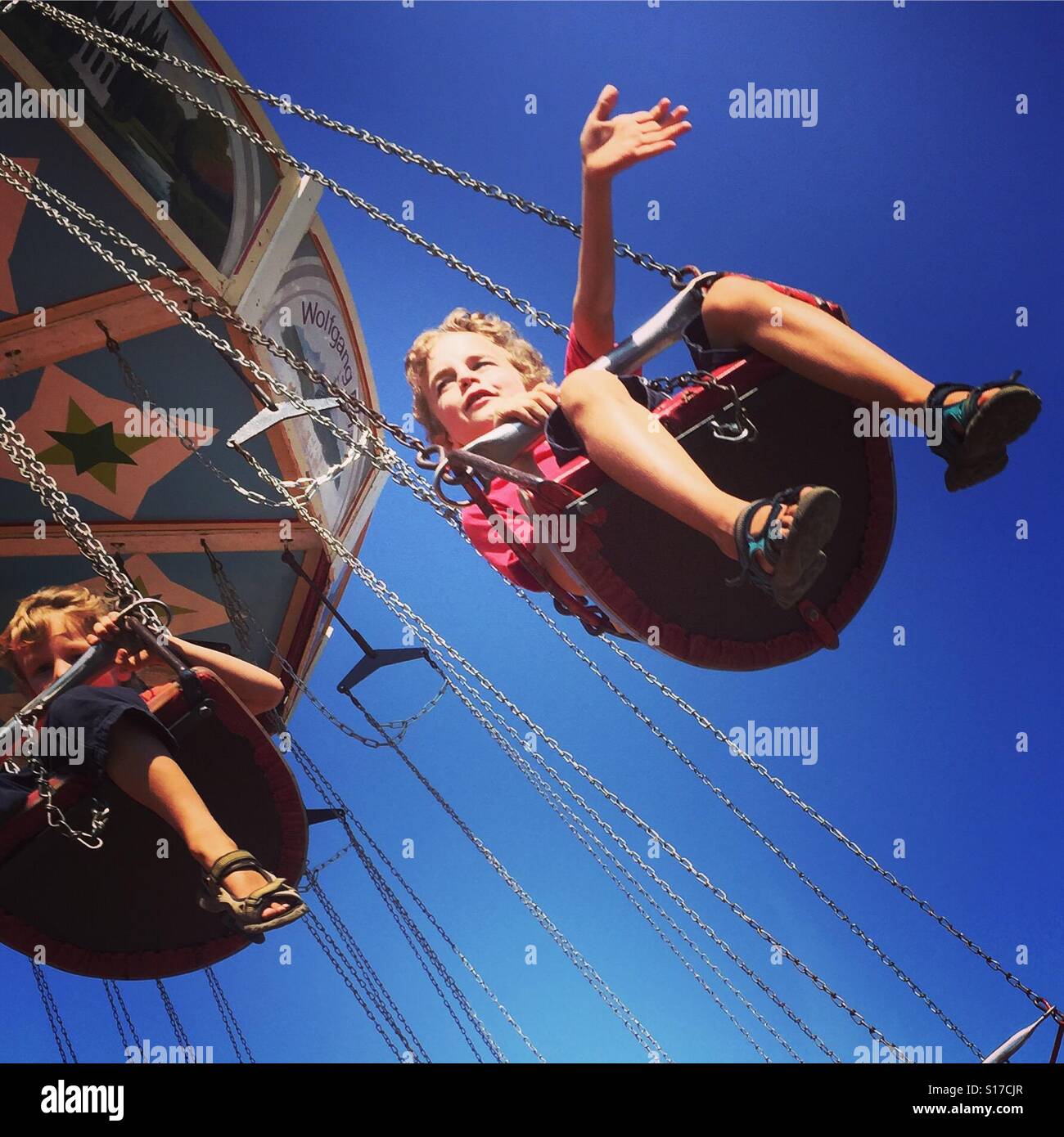Fairground swings hi-res stock photography and images - Alamy