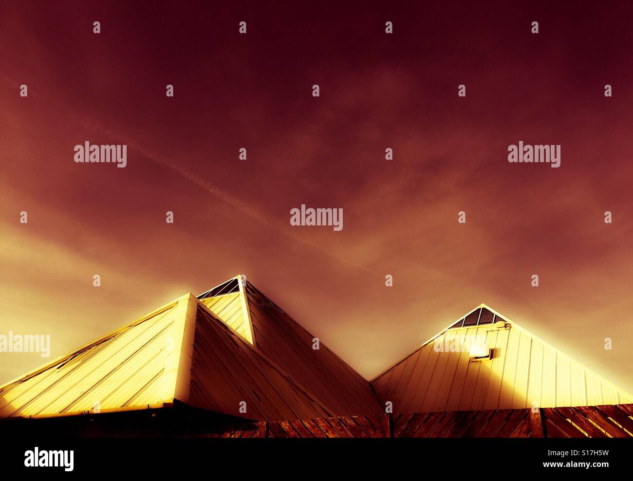 Glowing pyramid shaped buildings Stock Photo - Alamy