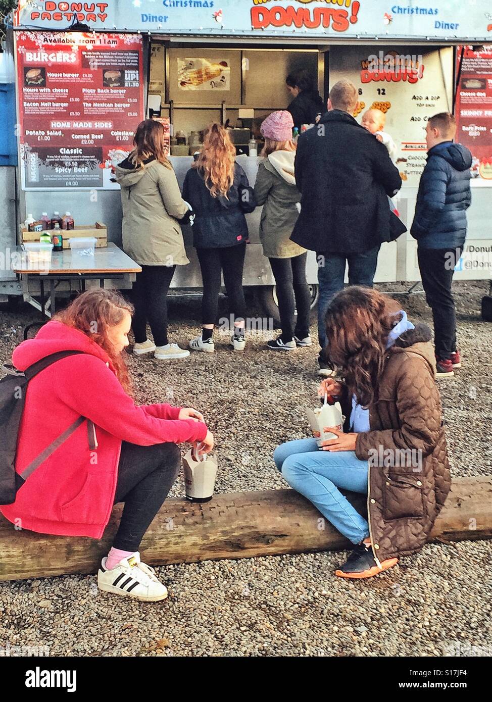 Gathering for fast food Stock Photo - Alamy