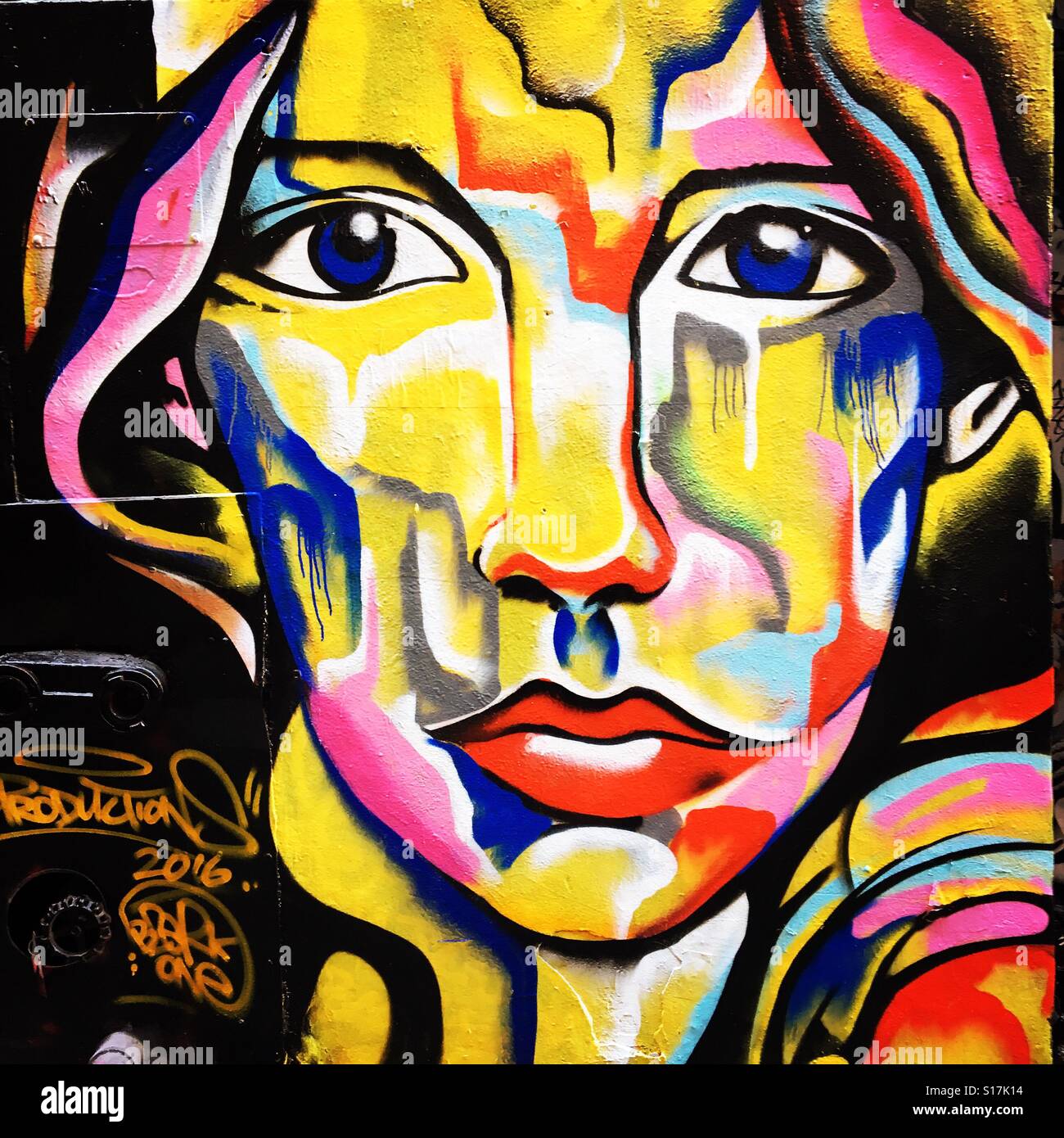 Street art of woman's face in Melbourne Stock Photo - Alamy