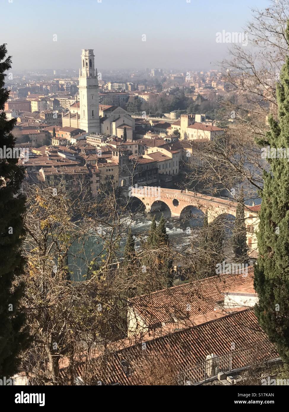 View over Adige river and stone bridge, Verona, Italy Stock Photo - Alamy