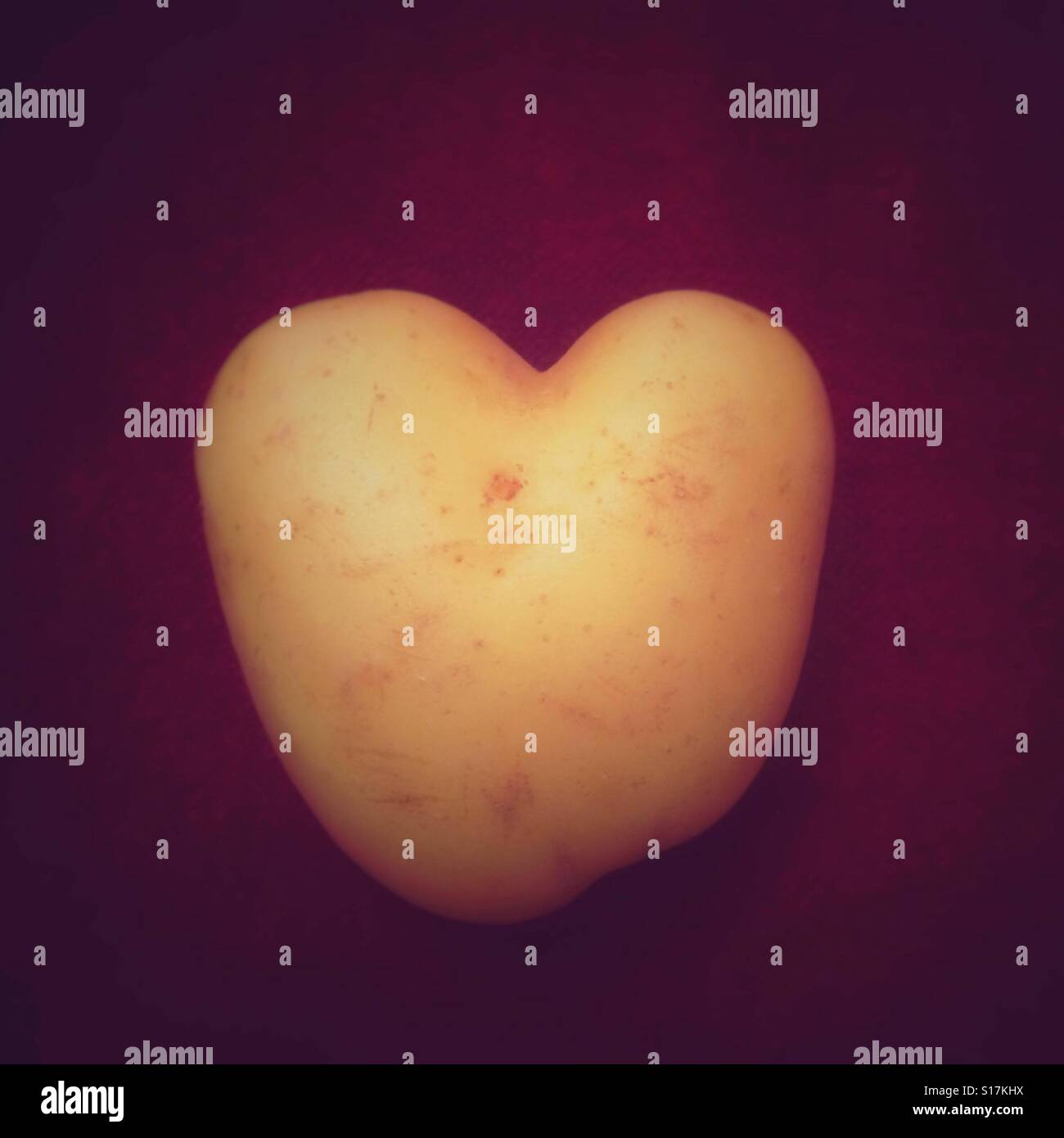 Heart shaped potato Stock Photo - Alamy