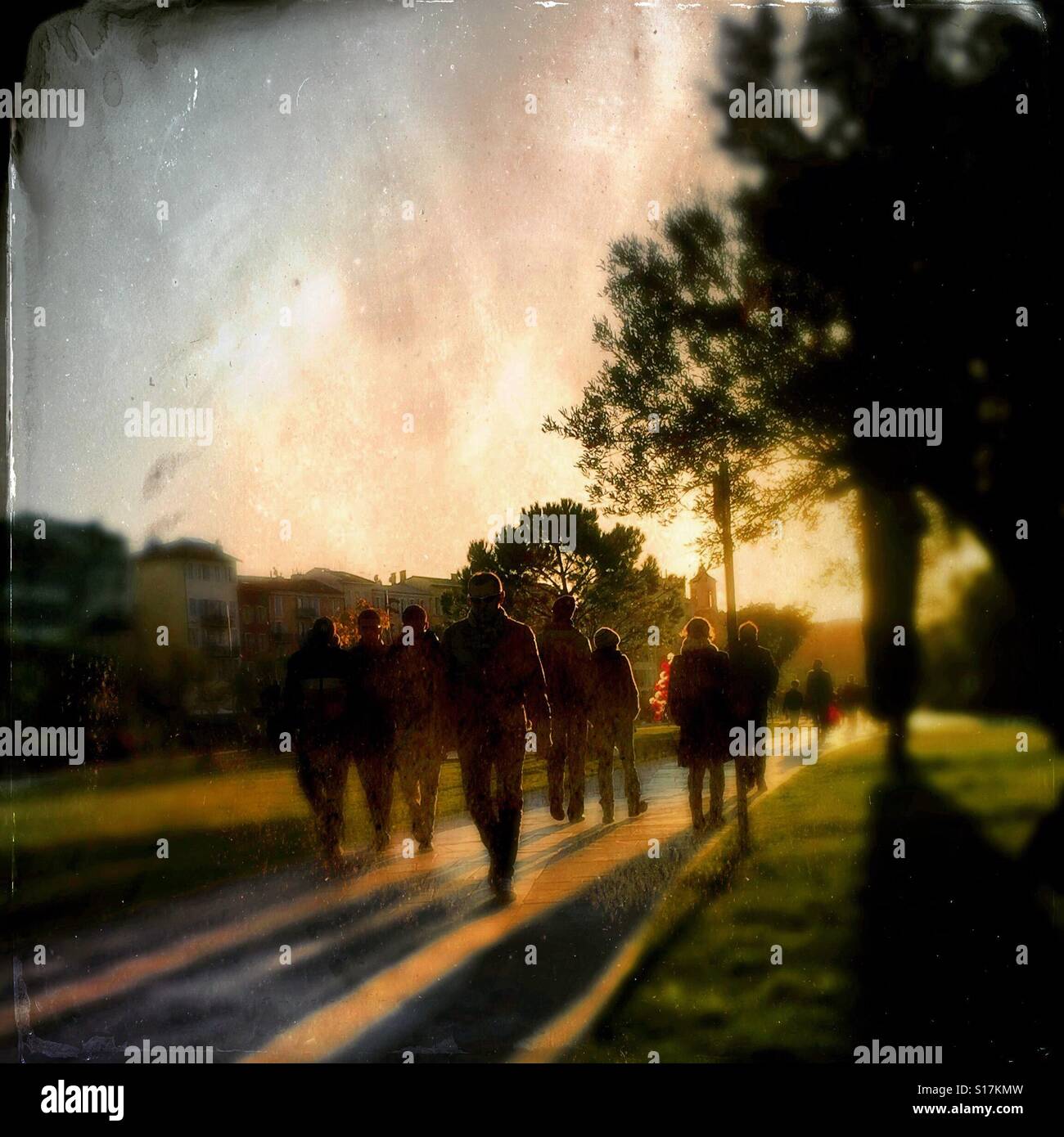 A walk into the sunset Stock Photo - Alamy