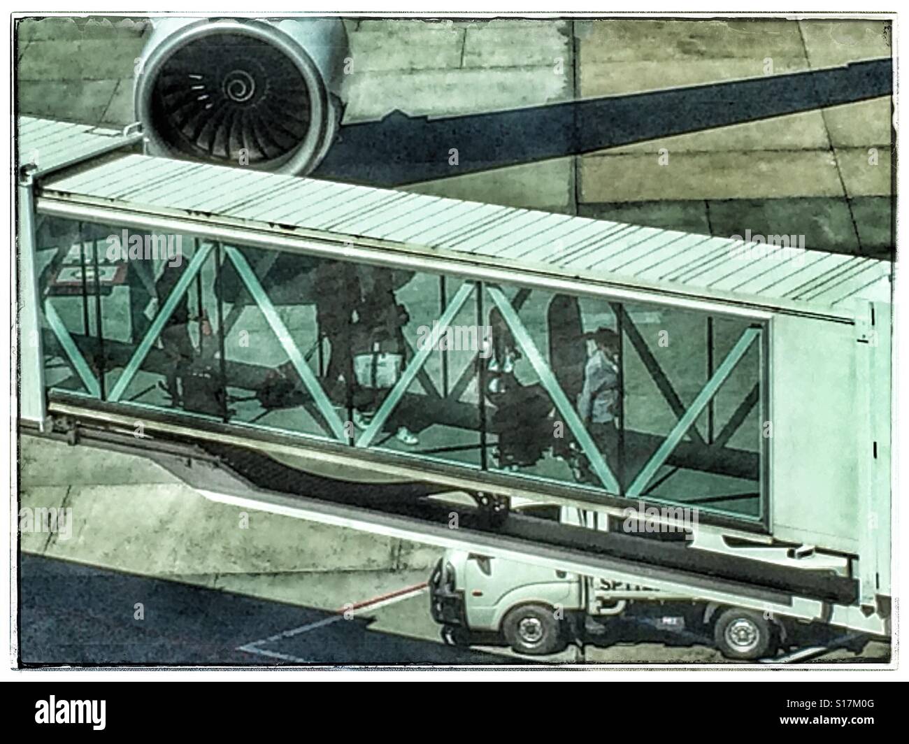 Passengers disembarking plane at Cape Town International Airport Stock ...
