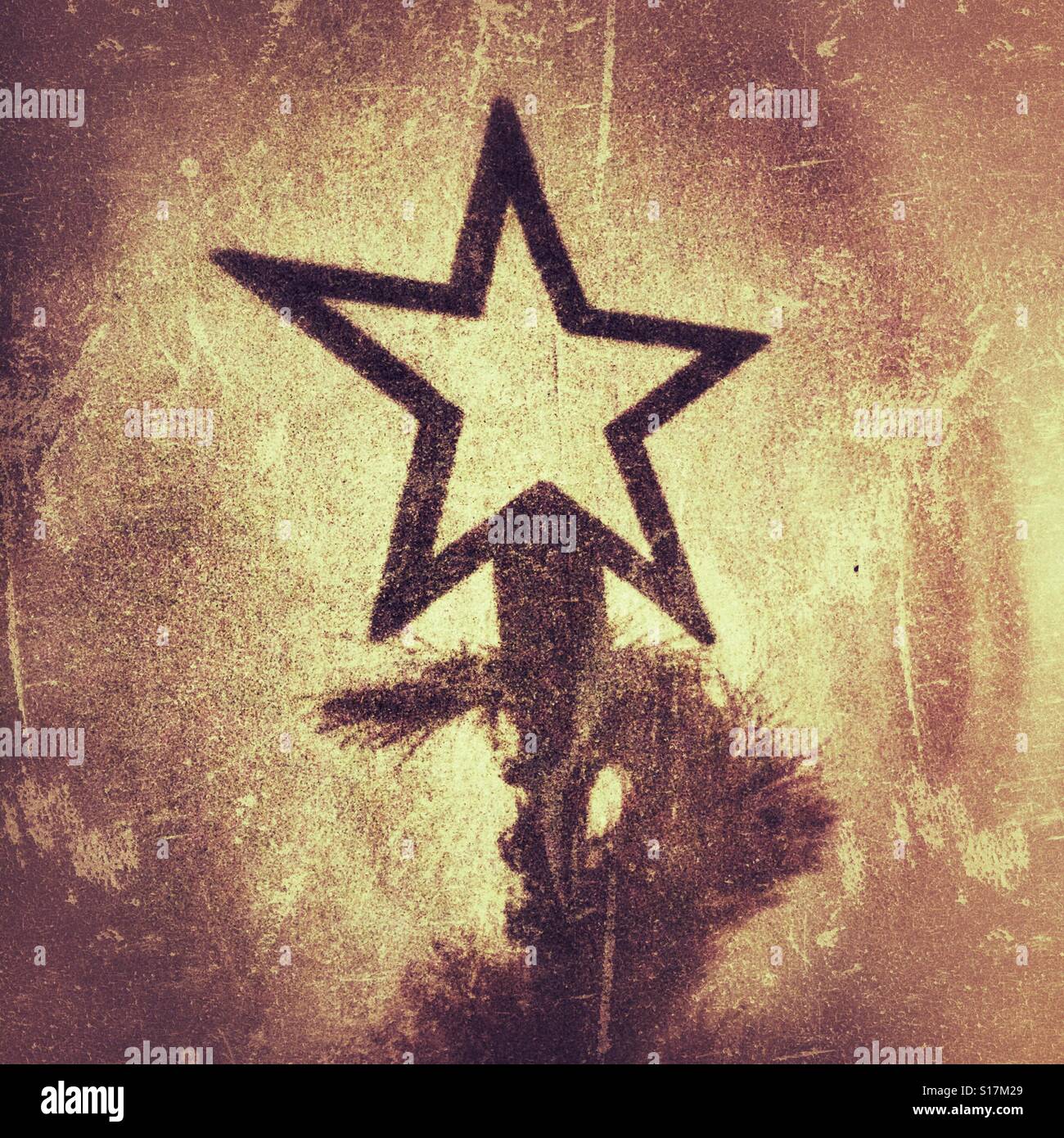 The shadow of a star on top of a Christmas tree Stock Photo - Alamy