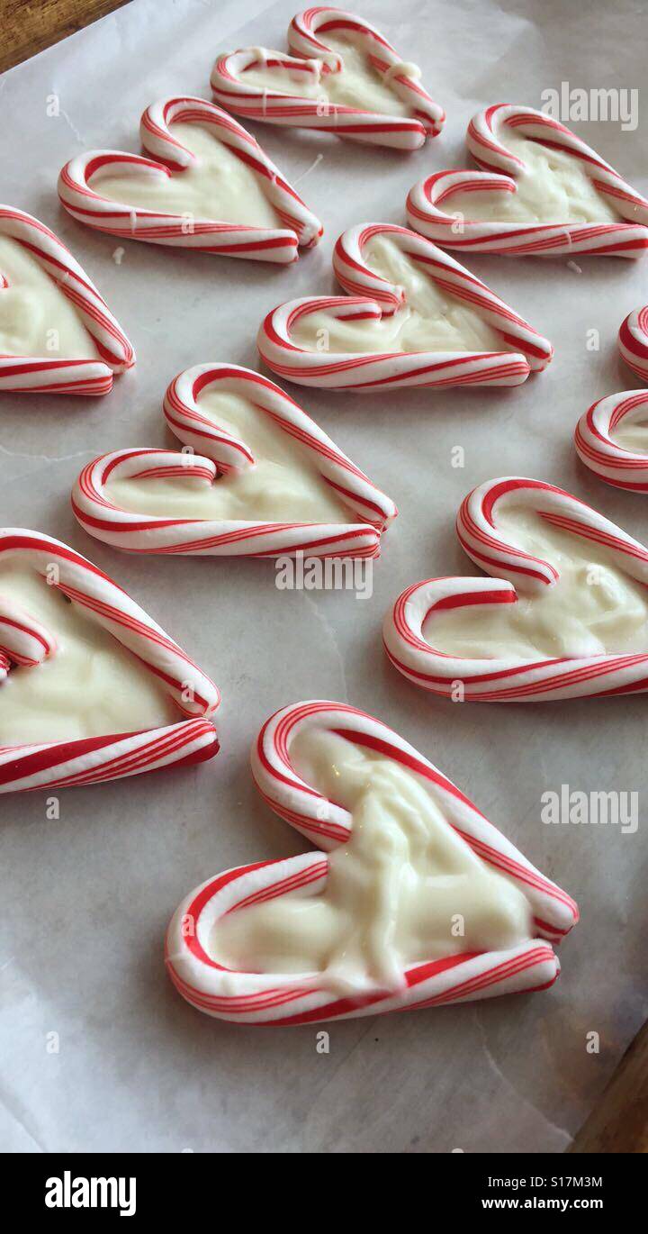 Candy cane hearts filled with white chocolate Stock Photo - Alamy