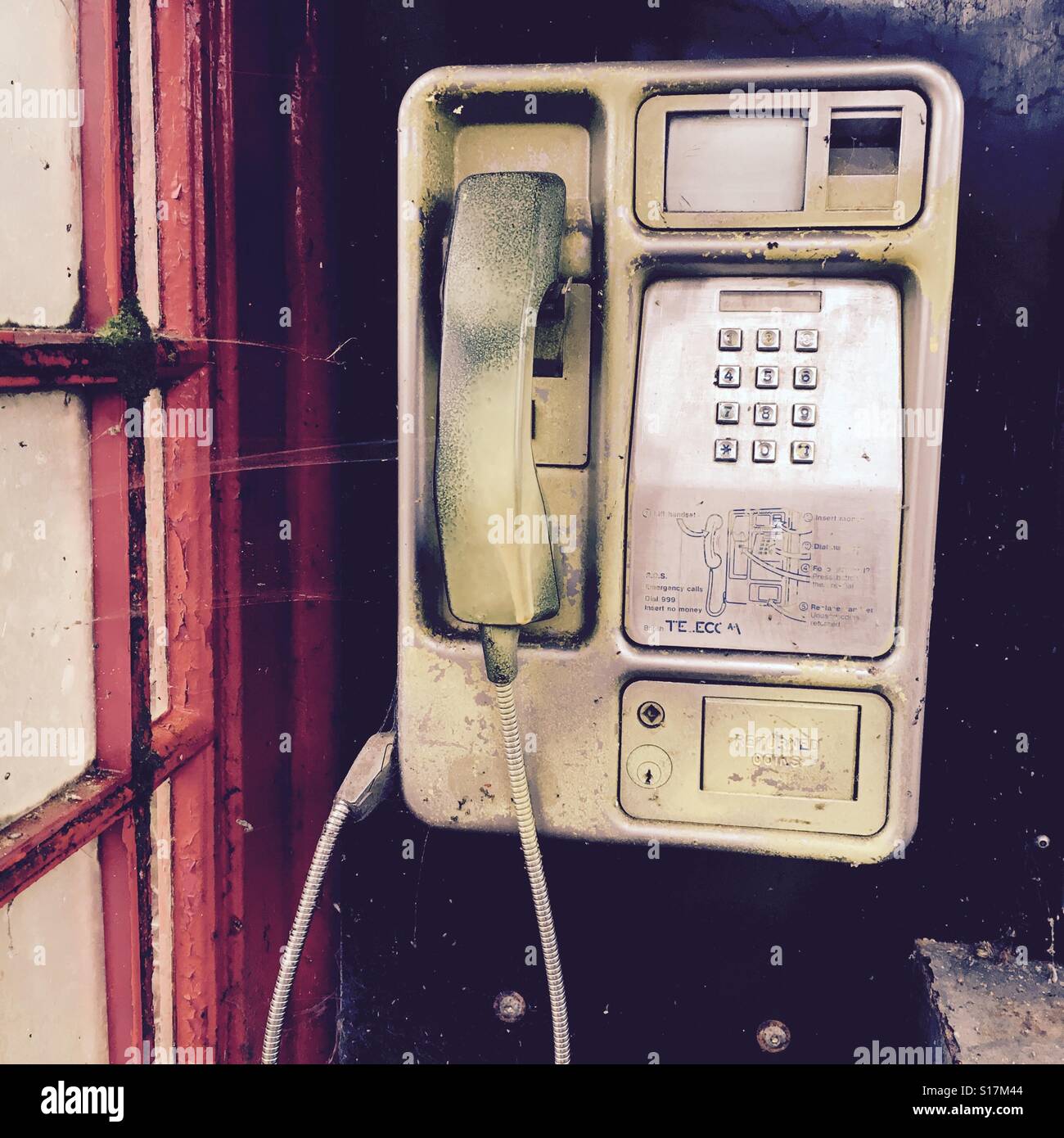 Public telephone call box covered in spray paint UK Stock Photo - Alamy