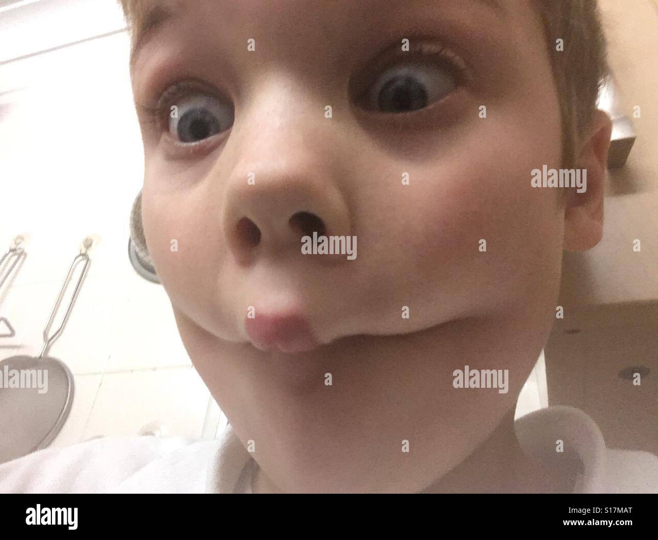 Boy with extreme duck face Stock Photo - Alamy