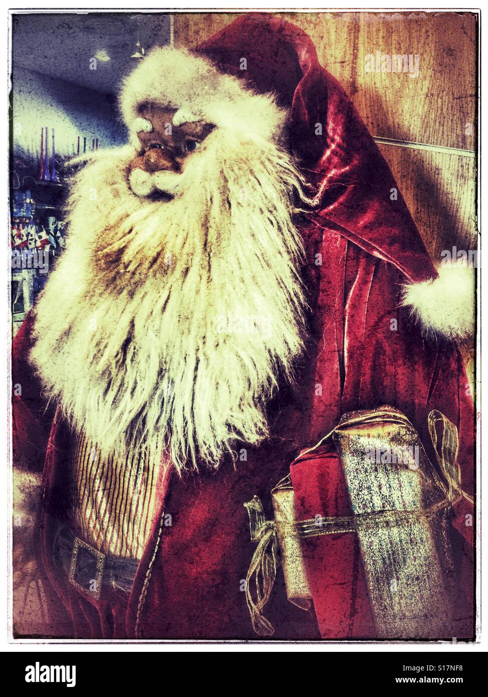 Santa mannequin with gifts Stock Photo - Alamy