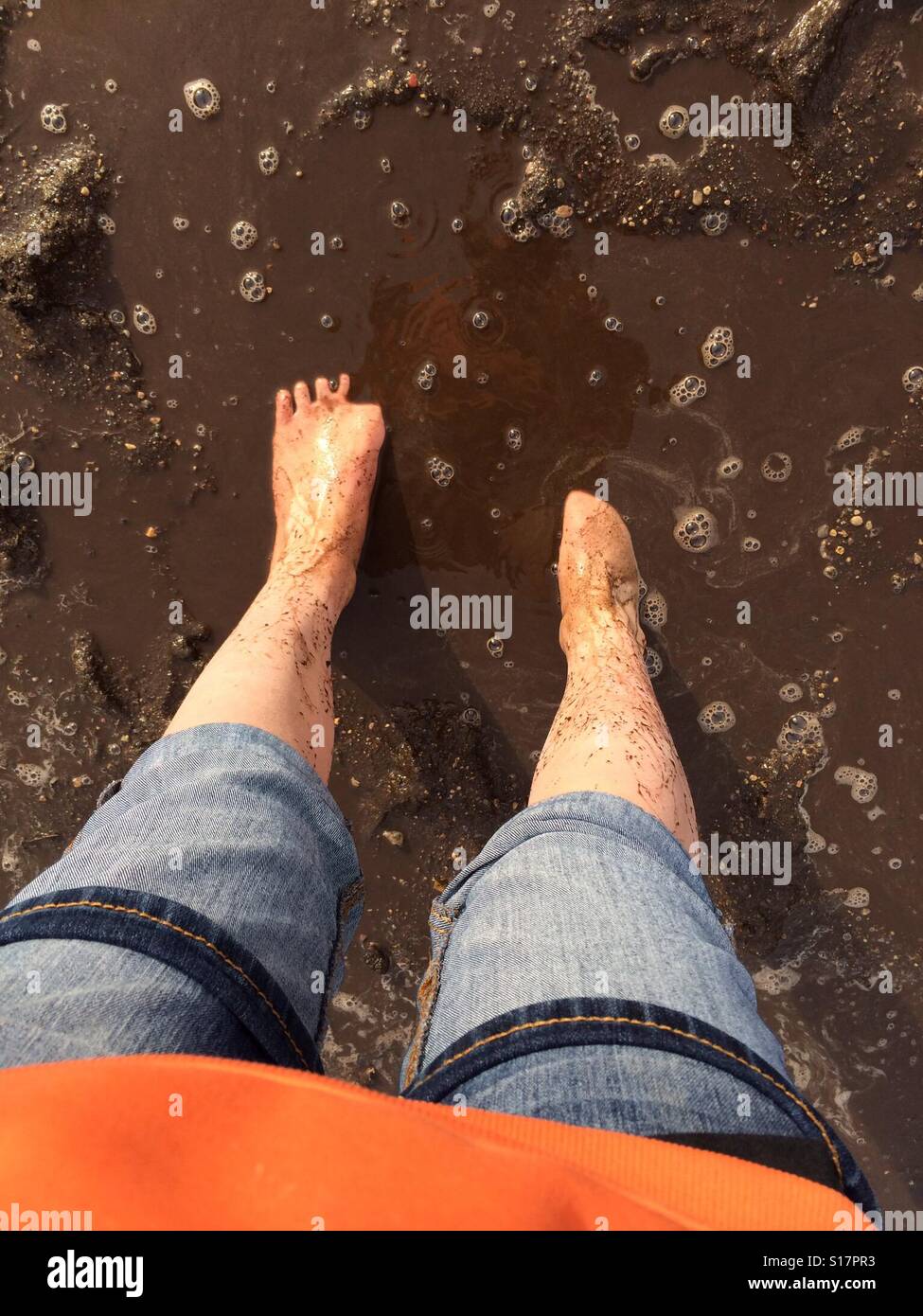 Feet Mud Puddle High Resolution Stock Photography and Images - Alamy