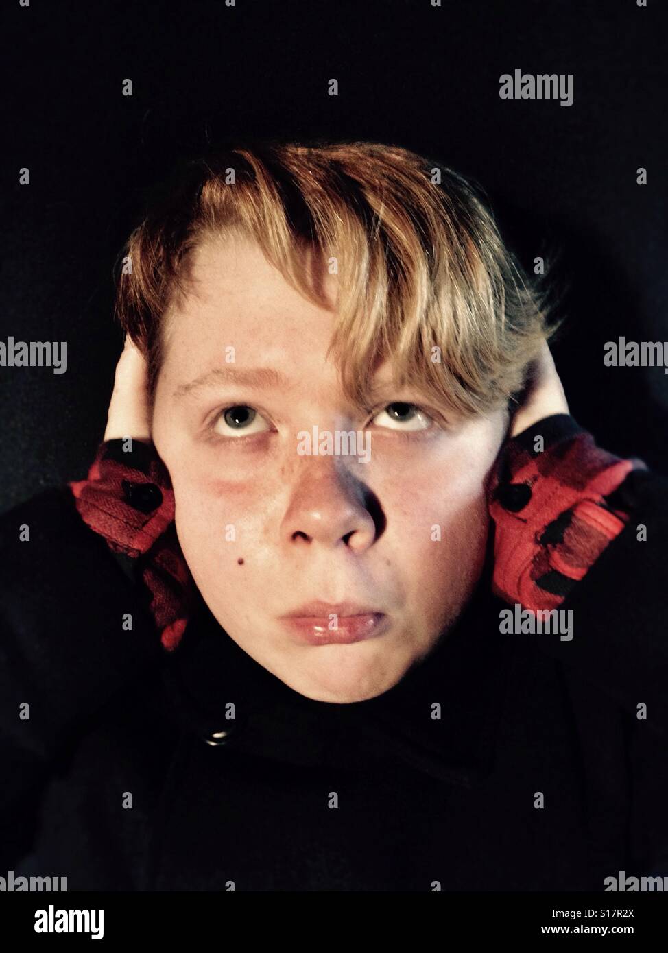 Boy not listening Stock Photo - Alamy