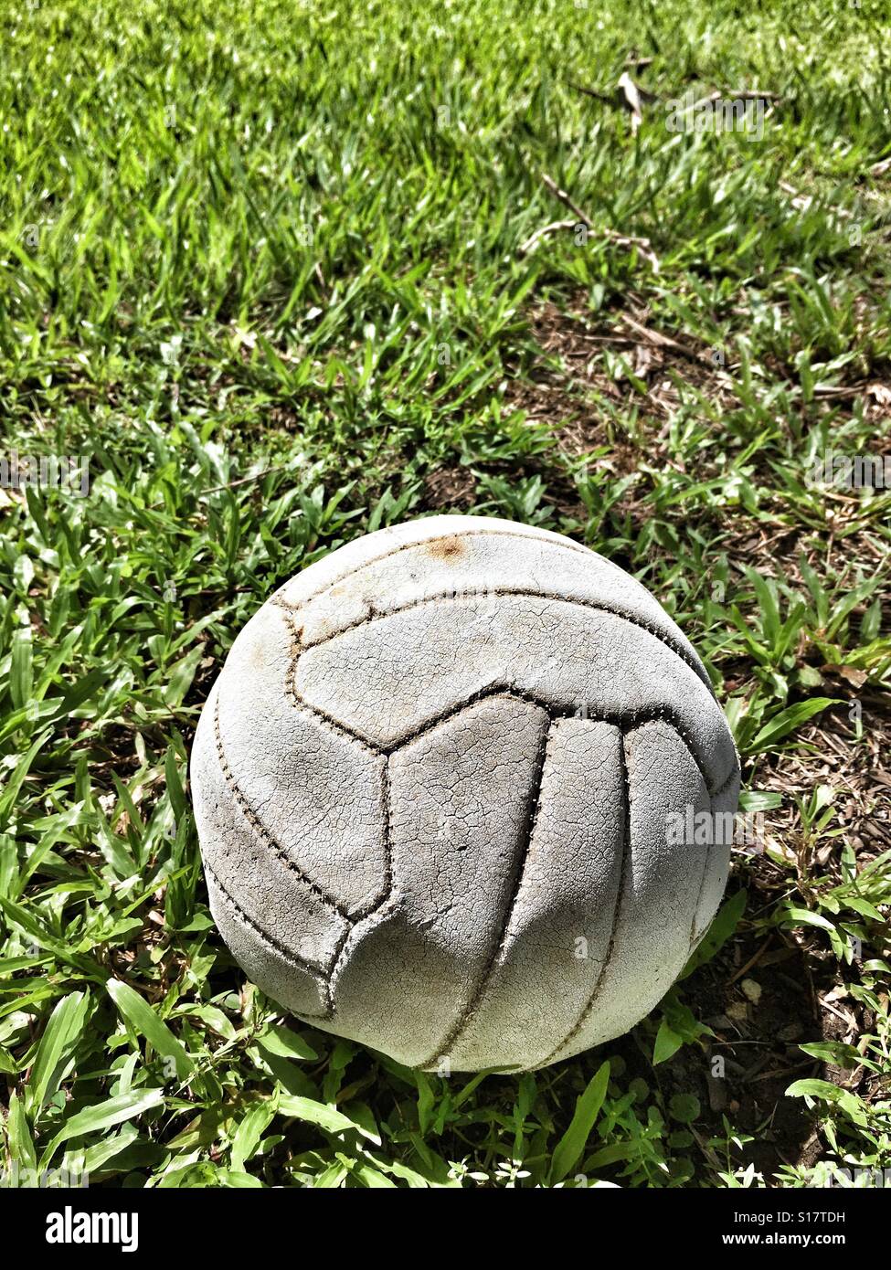 Deflated soccer ball hi-res stock photography and images - Alamy