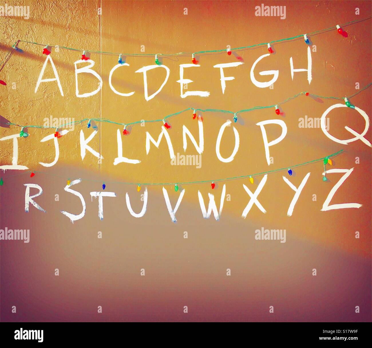 Alphabet and string of lights Stock Photo - Alamy